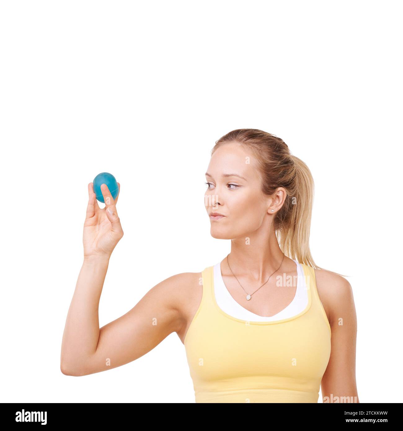 Woman, squeeze and stress ball in fitness for exercise against a white ...