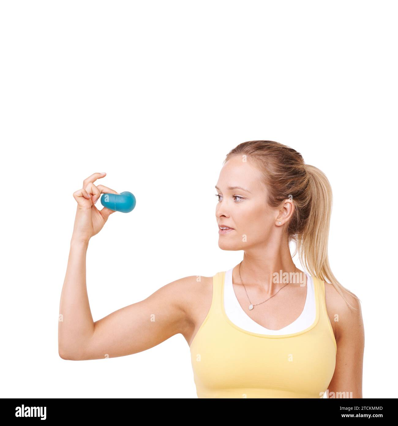 Strong woman, squeeze and stress ball in fitness for exercise against a ...