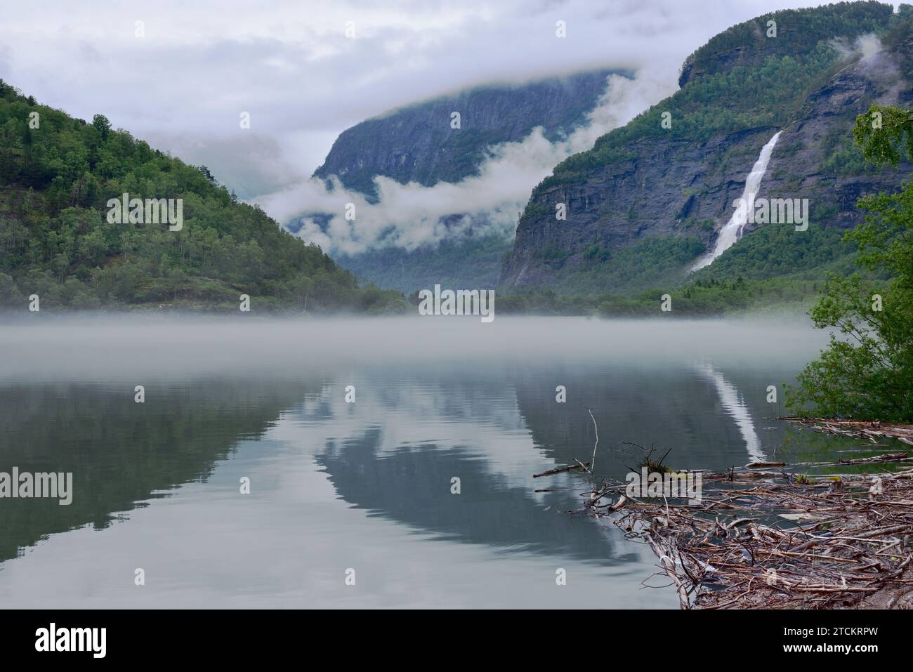 Asafossen waterfall reflected in Eide Lake Stock Photo - Alamy