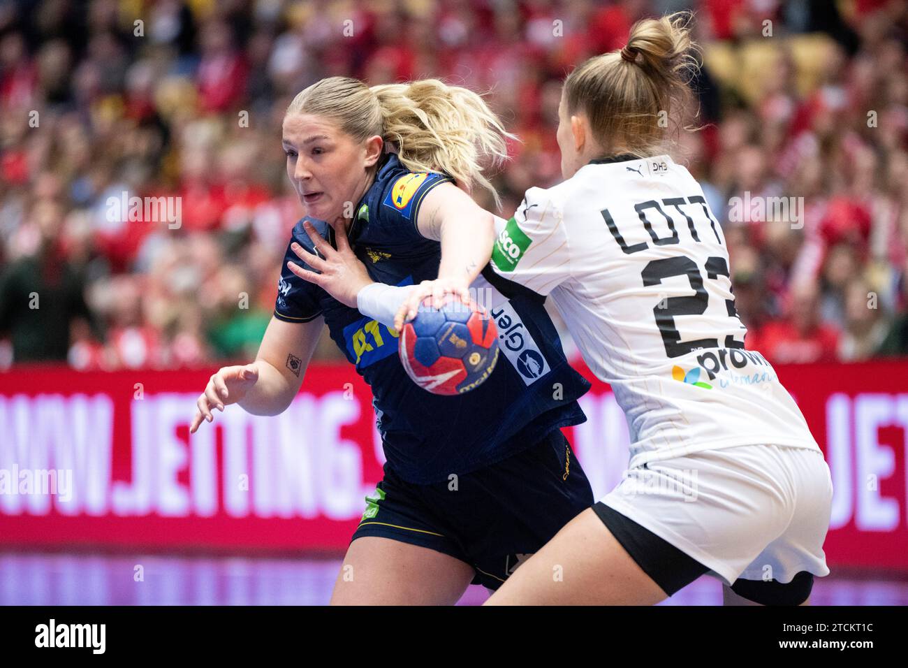 Herning, Denmark. 13th Dec, 2023. Nina Dano of Sweden (L) in action with Annika Lott of Germany ...