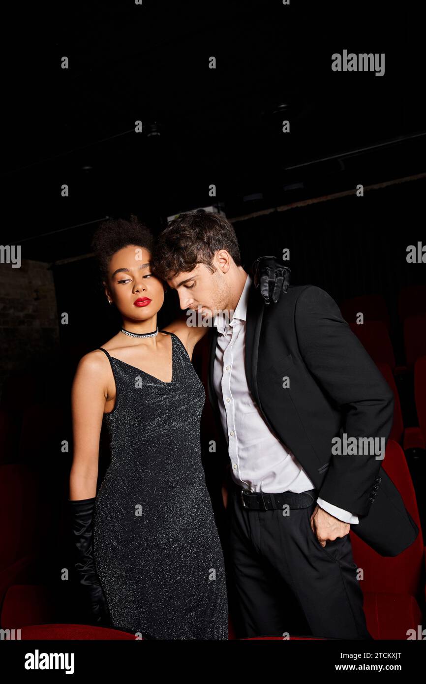 appealing african american woman with arm on shoulder of her handsome ...