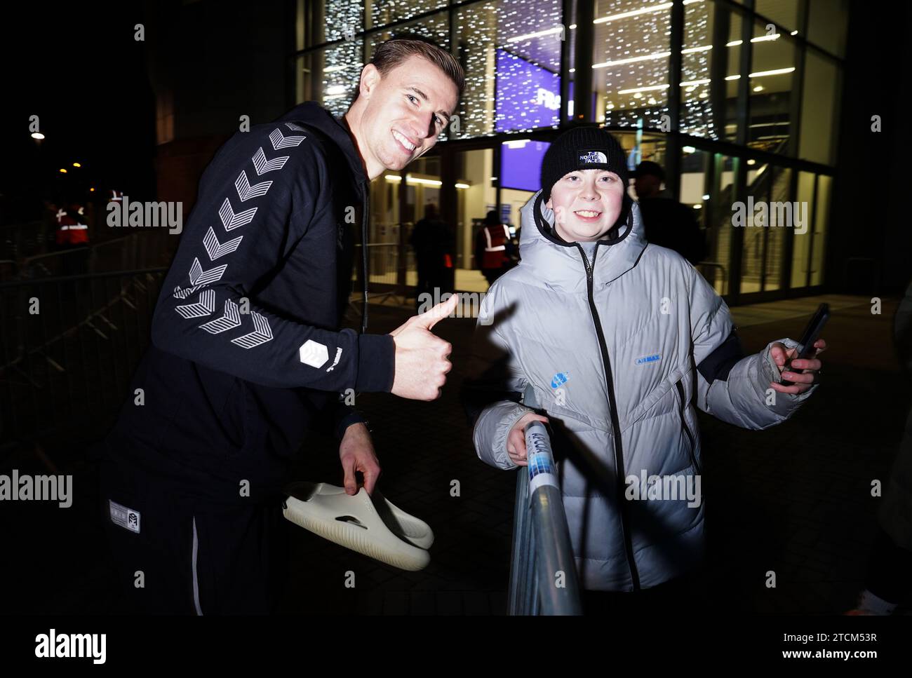 Coventry City's Ben Sheaf poses for a photo with a fan outside the ...