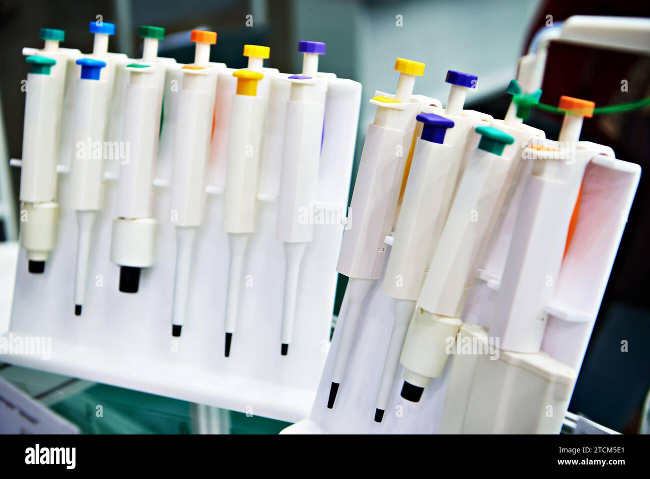 Chemical dispensers on stand exhibit Stock Photo - Alamy