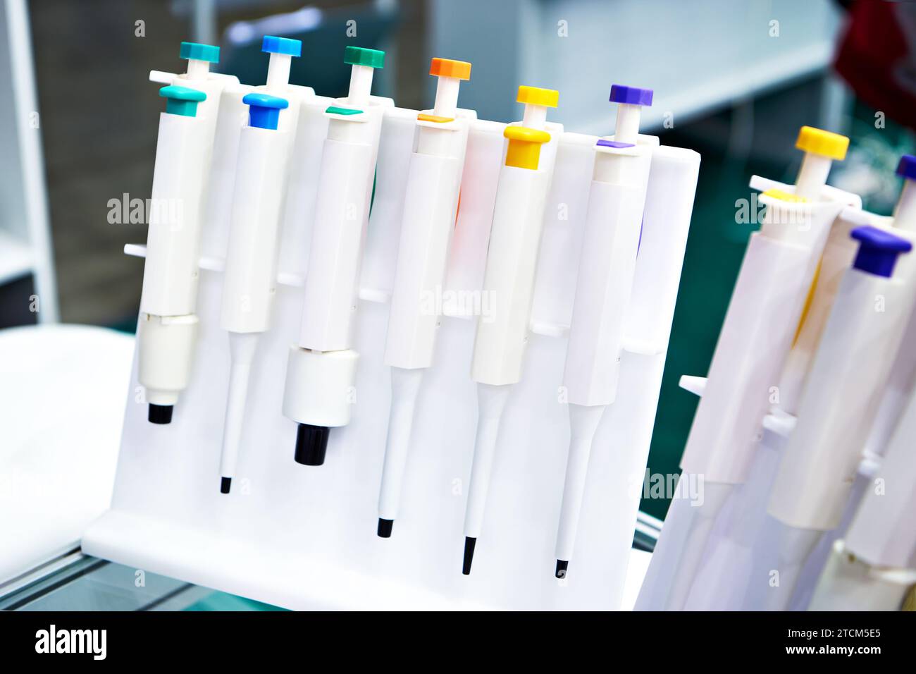Chemical dispensers on stand exhibit Stock Photo - Alamy