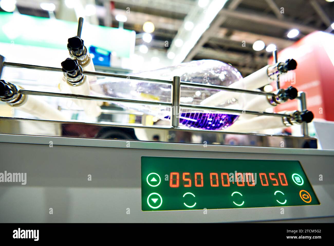 Laboratory shaker with heating and flask with solution Stock Photo - Alamy