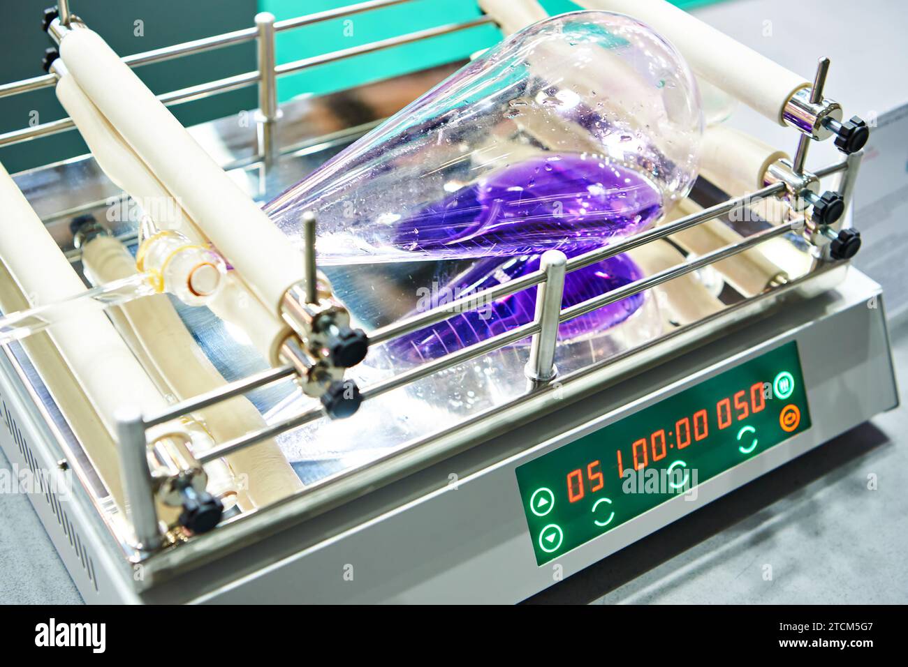 Laboratory shaker with heating and flask with solution Stock Photo - Alamy