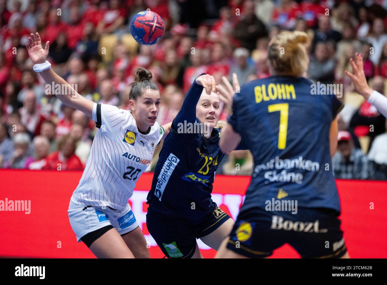 Herning, Denmark. 13th Dec, 2023. Emma Lindqvist and Linn Blohm of Sweden in action with Emily ...