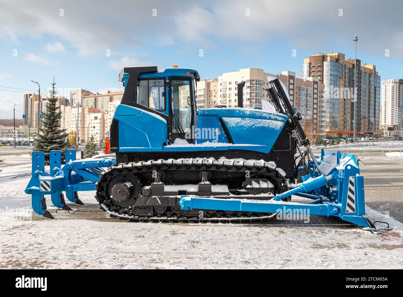 Blue bulldozer tractor with mouldboard at an industrial exhibition at ...