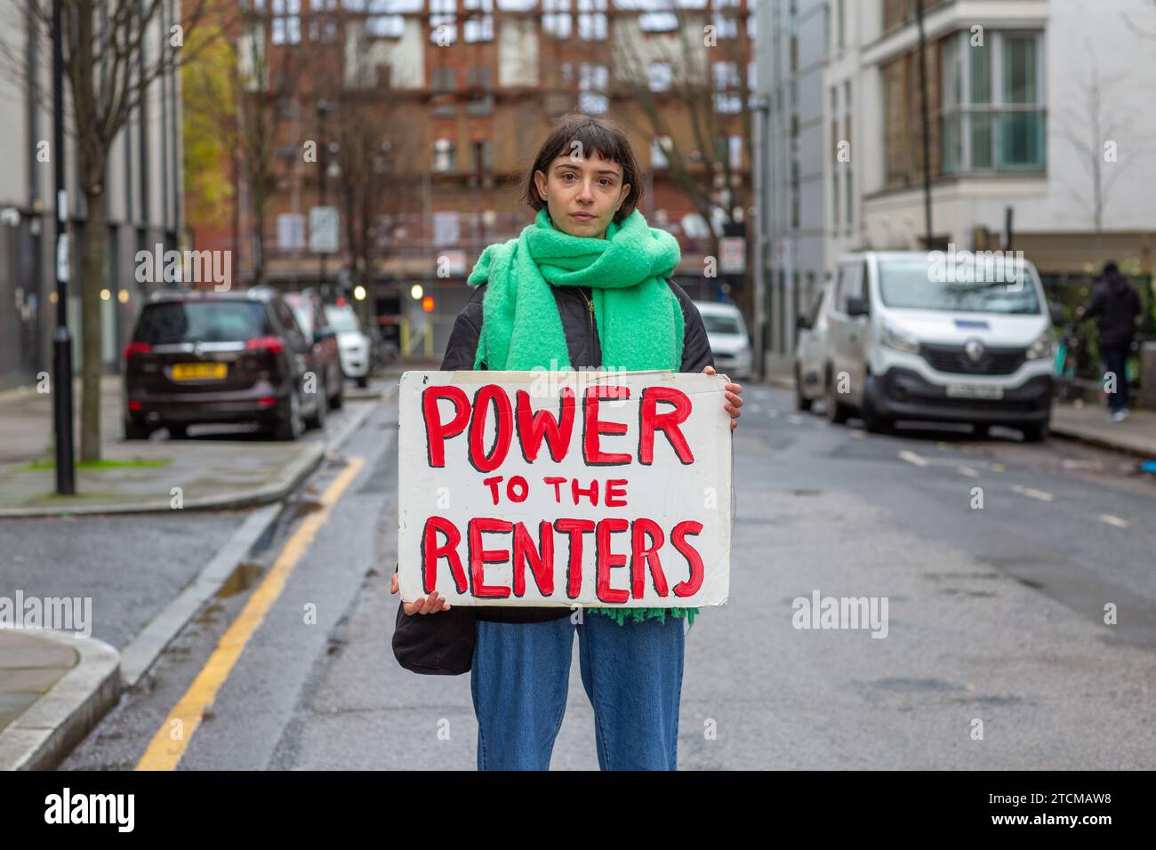 Female protester holding sign power to the renters in London , UK Stock ...