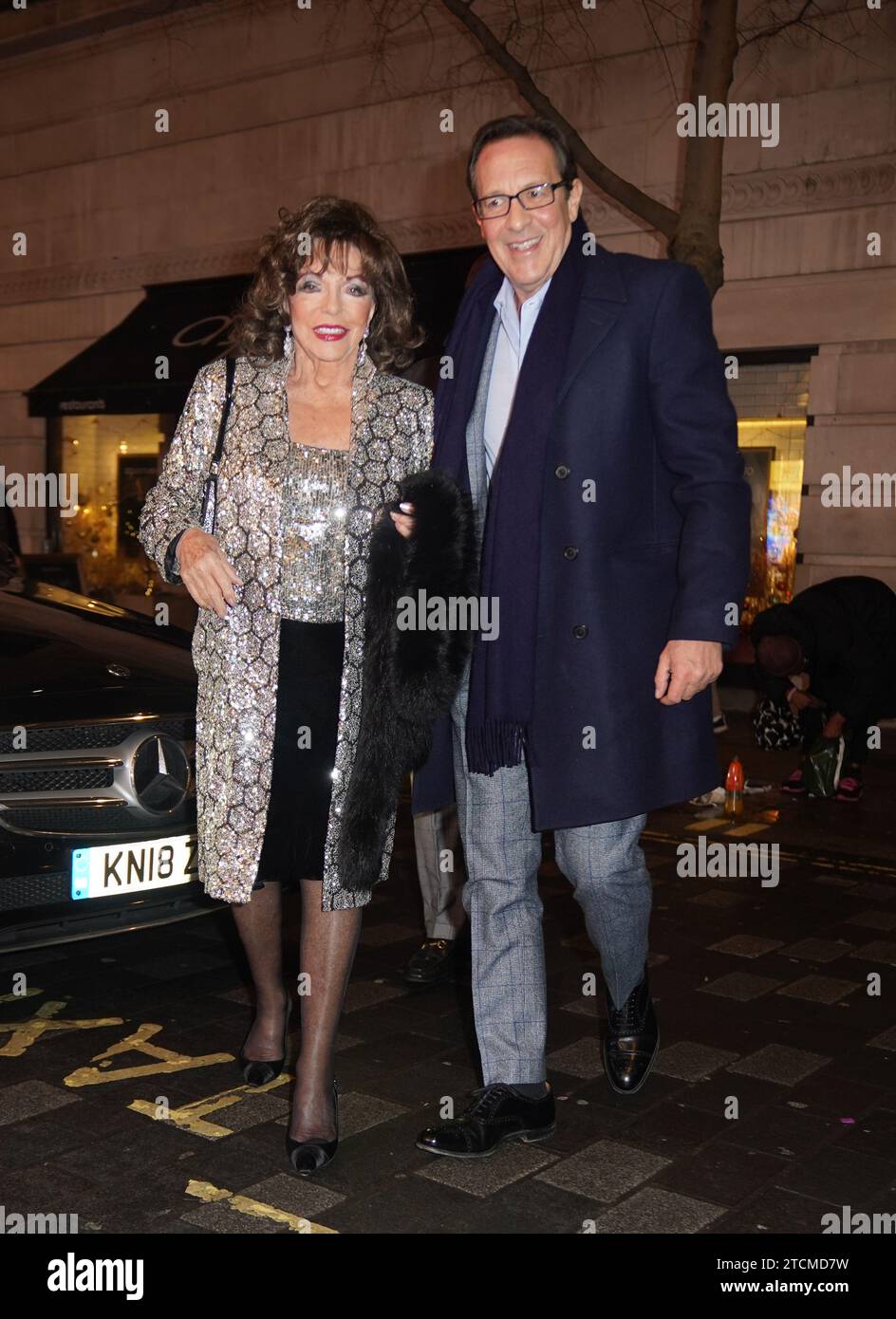 Joan Collins and Percy Gibson attend the opening night of Peter Pan at ...