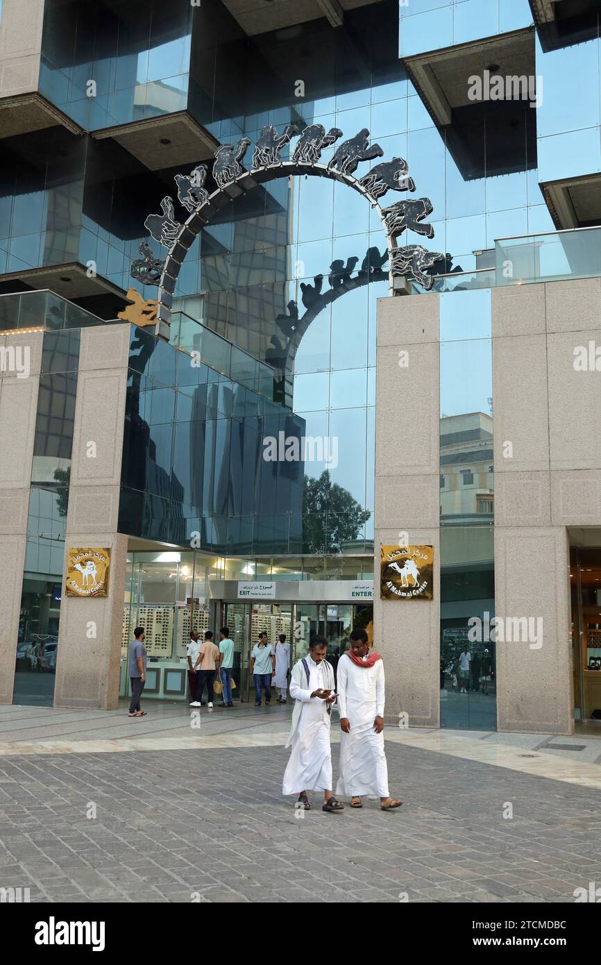 Shoppers at the famous Al Mahmal shopping center built in the 1980s in ...