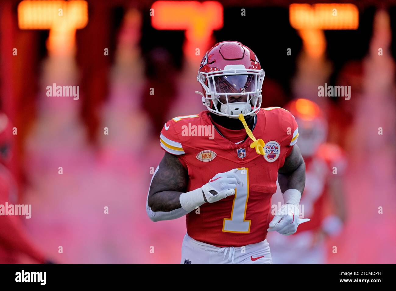 Kansas City Chiefs running back Jerick McKinnon runs onto the field ...