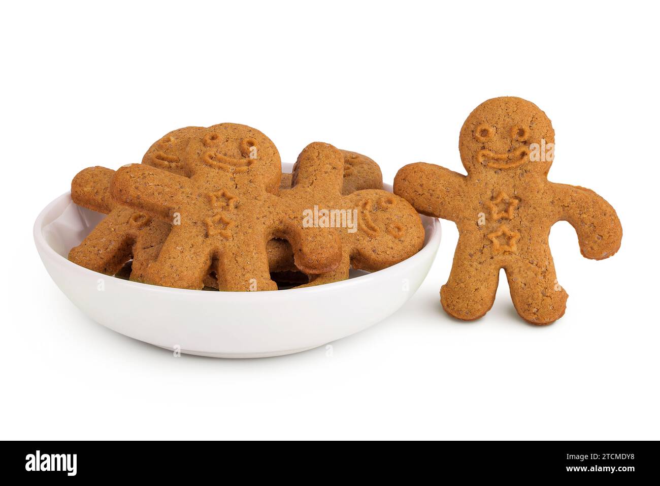 Gingerbread man in ceramic bowl isolated on white background Stock ...