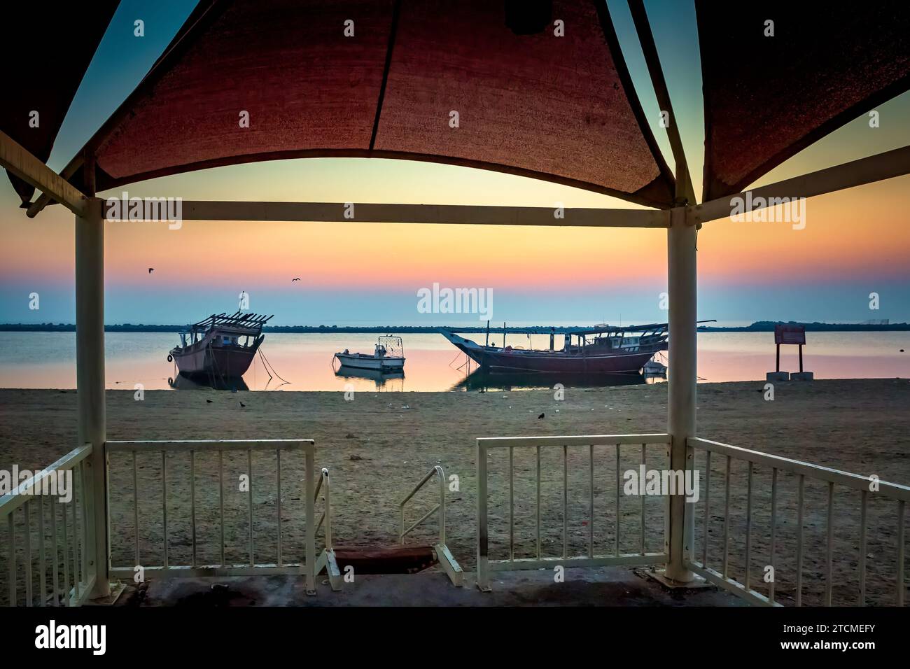 Golden sunrise in Dammam Corniche,Saudi Arabia: Peaceful waters and ...