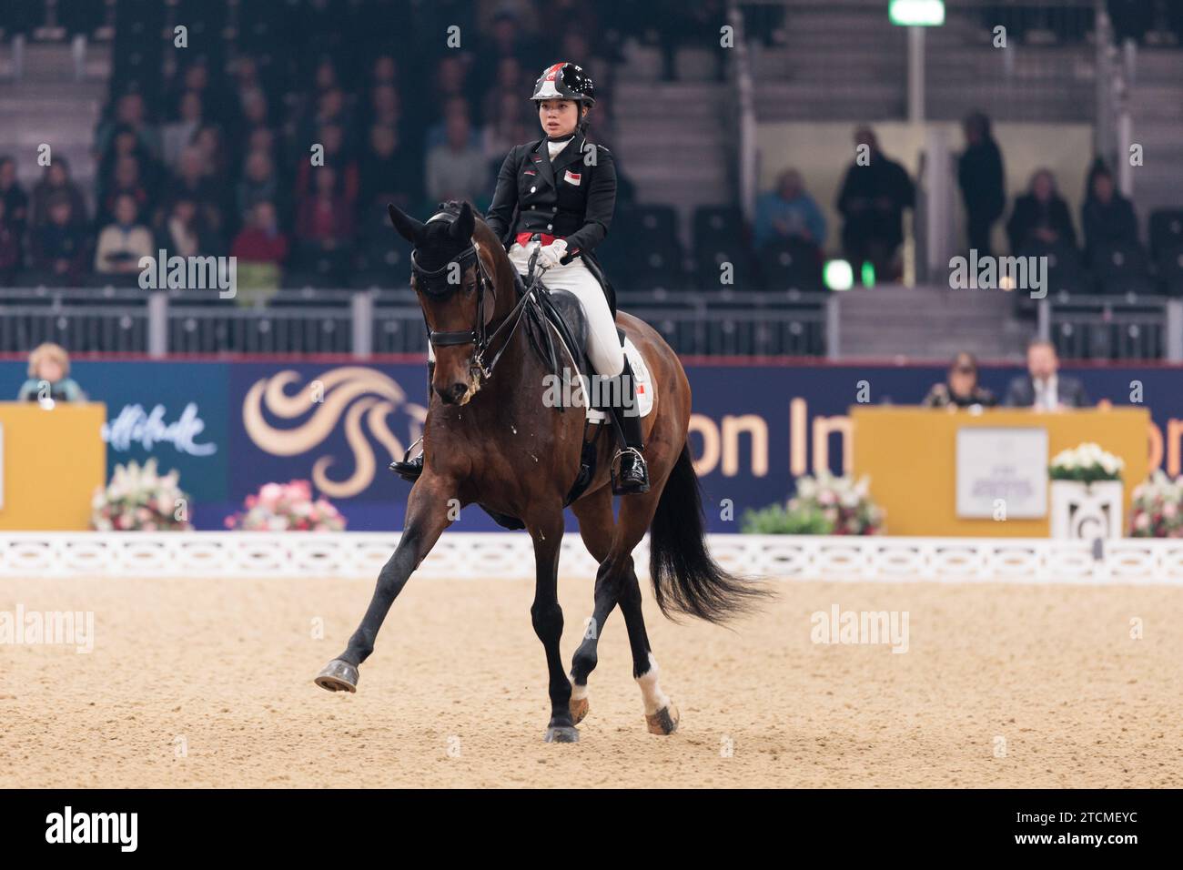 London, UK. 13th Dec, 2023. Caroline Chew of Singapore with Blue Hors ...