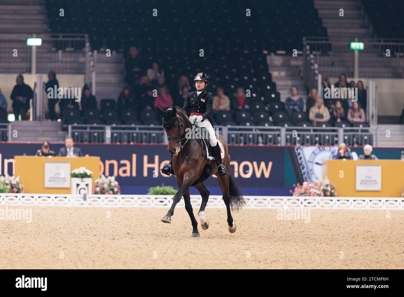 London, UK. 13th Dec, 2023. Caroline Chew of Singapore with Blue Hors ...
