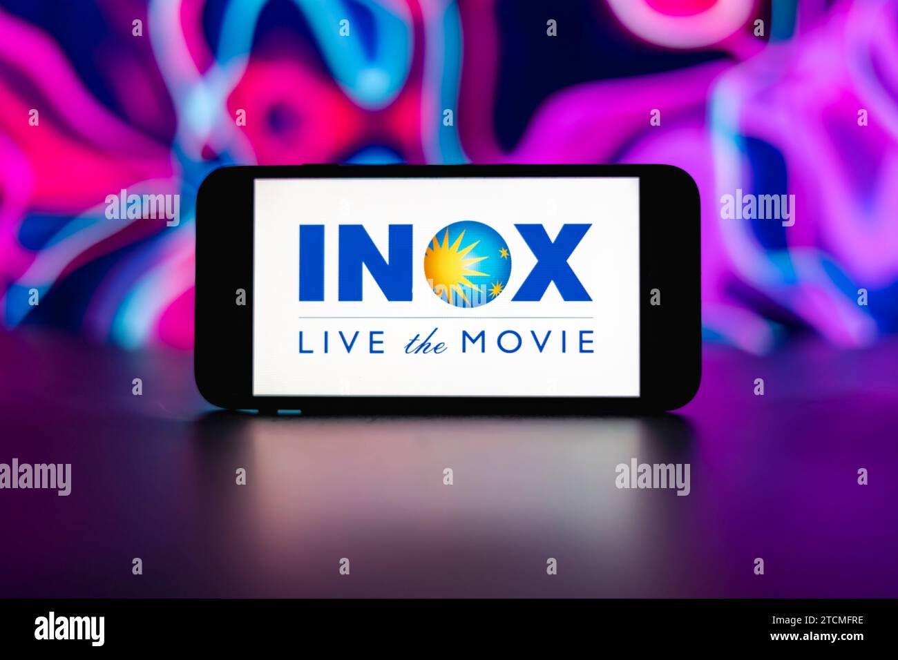 In this photo illustration, the Inox logo is seen displayed on a mobile ...
