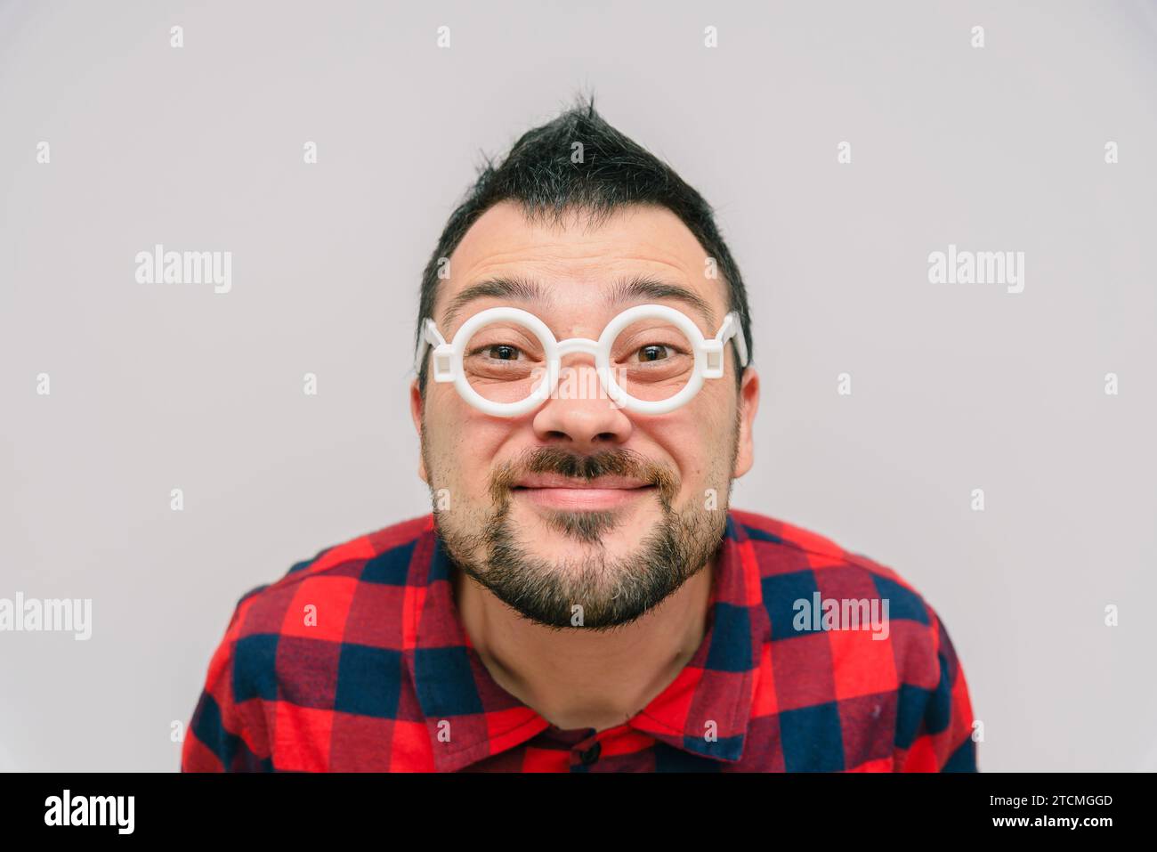 Funny smiling man with glasses portrait enjoying and making faces Stock ...