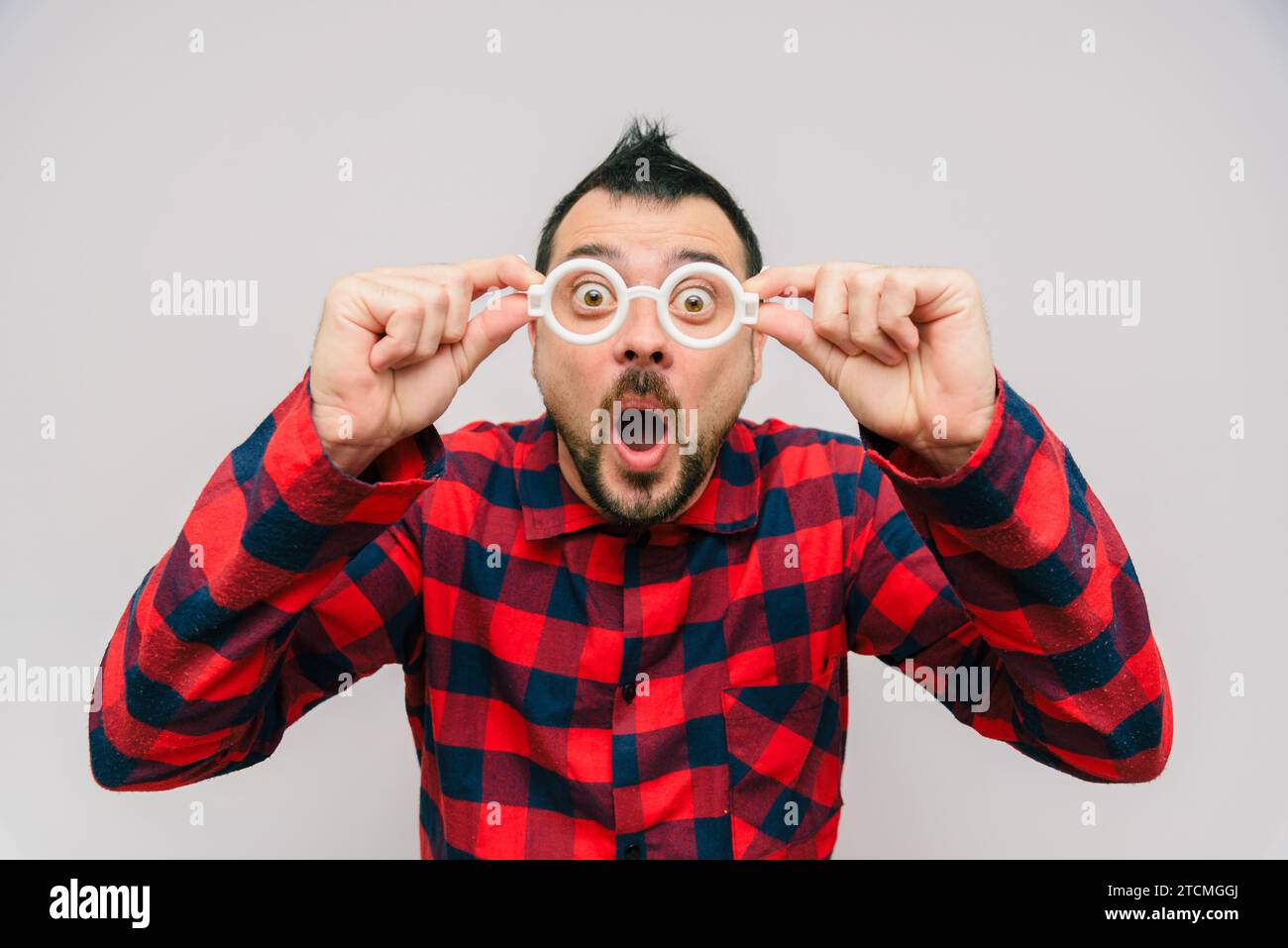 Excited brunette man in hi-res stock photography and images - Alamy