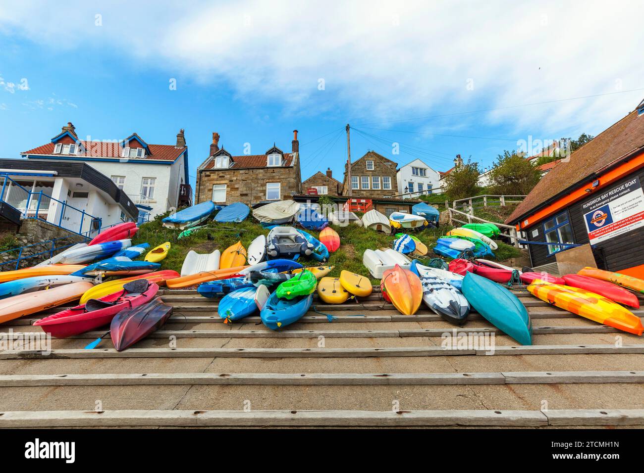 Canoes at Runswick Bay, North Yorkshire Stock Photo - Alamy