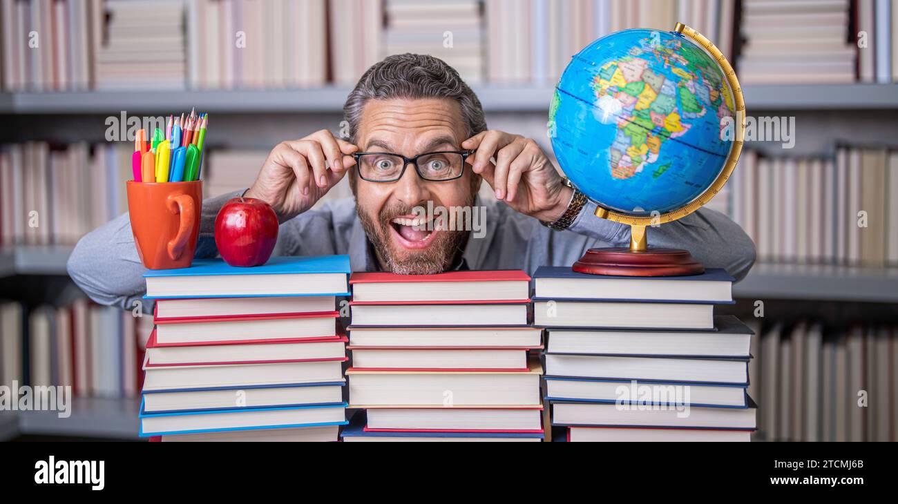 Teachers day. Teacher in classroom. teacher with book in library ...