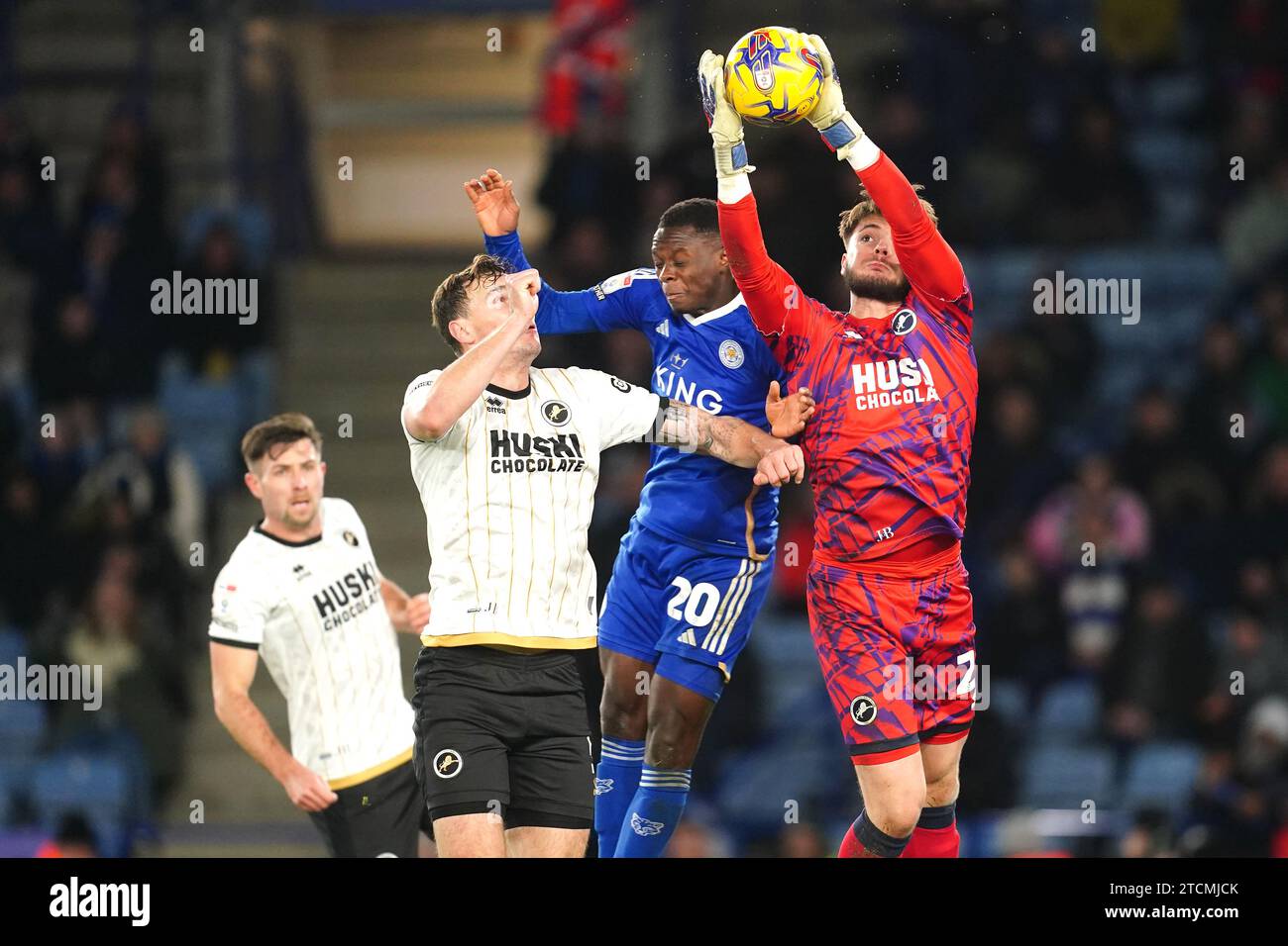 Millwall goalkeeper Matija Sarkic (right) claims the ball from ...