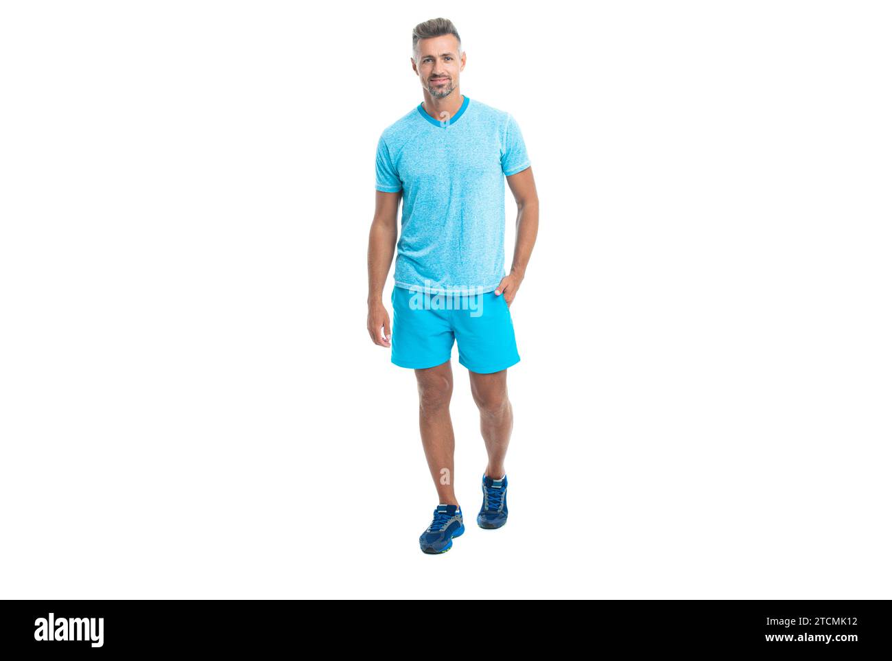 positive runner sport man isolated on white background. Athletic mature ...