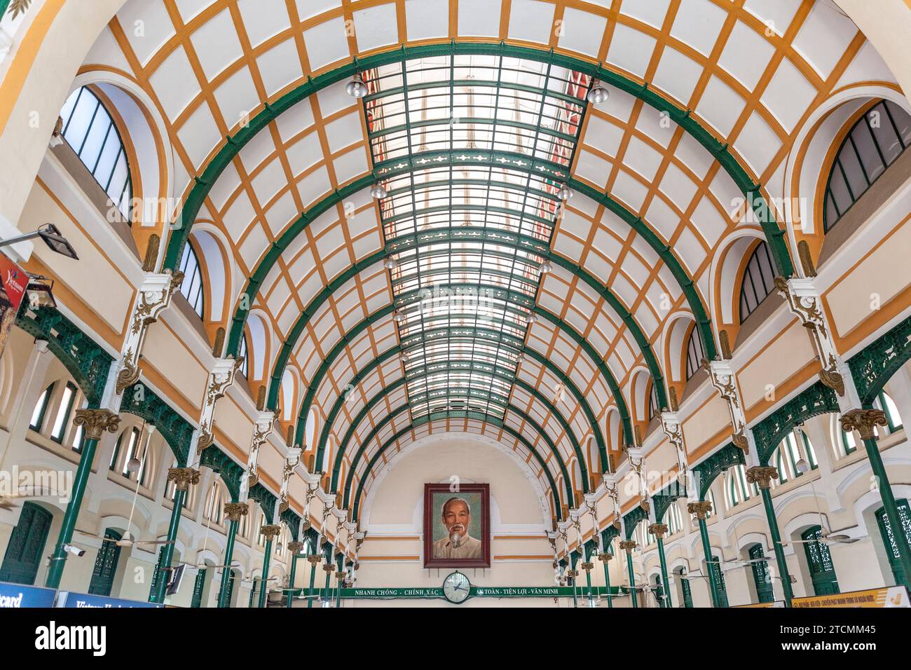 Interior arched roof of Saigon Central Post Office, with portrait of ...