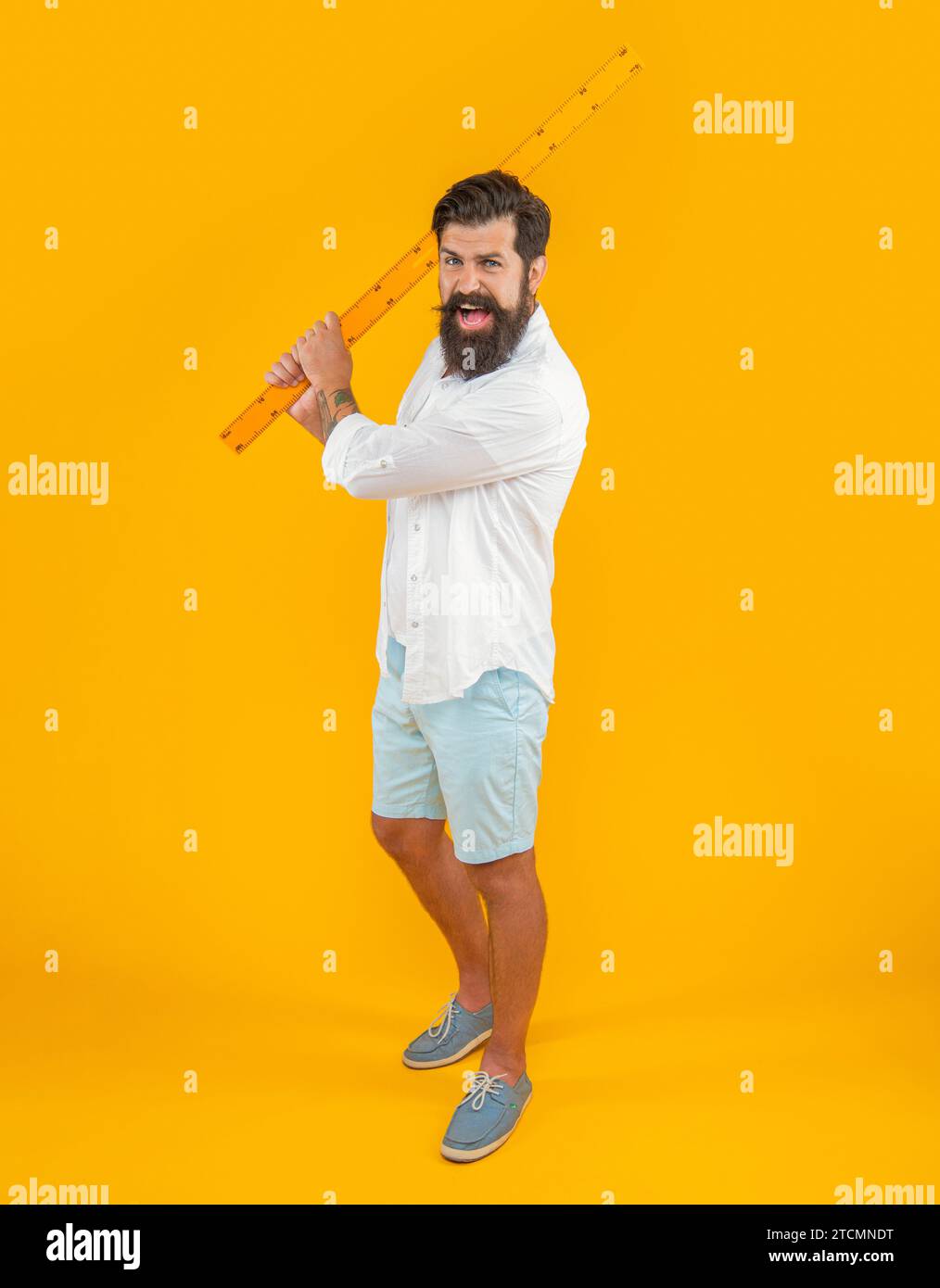 Angry teacher and ruler hi-res stock photography and images - Alamy