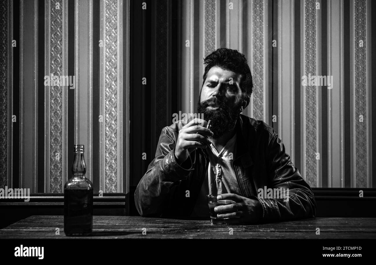 Man drinking whiskey, brandy, cognac. Degustation and tasting. Man with ...