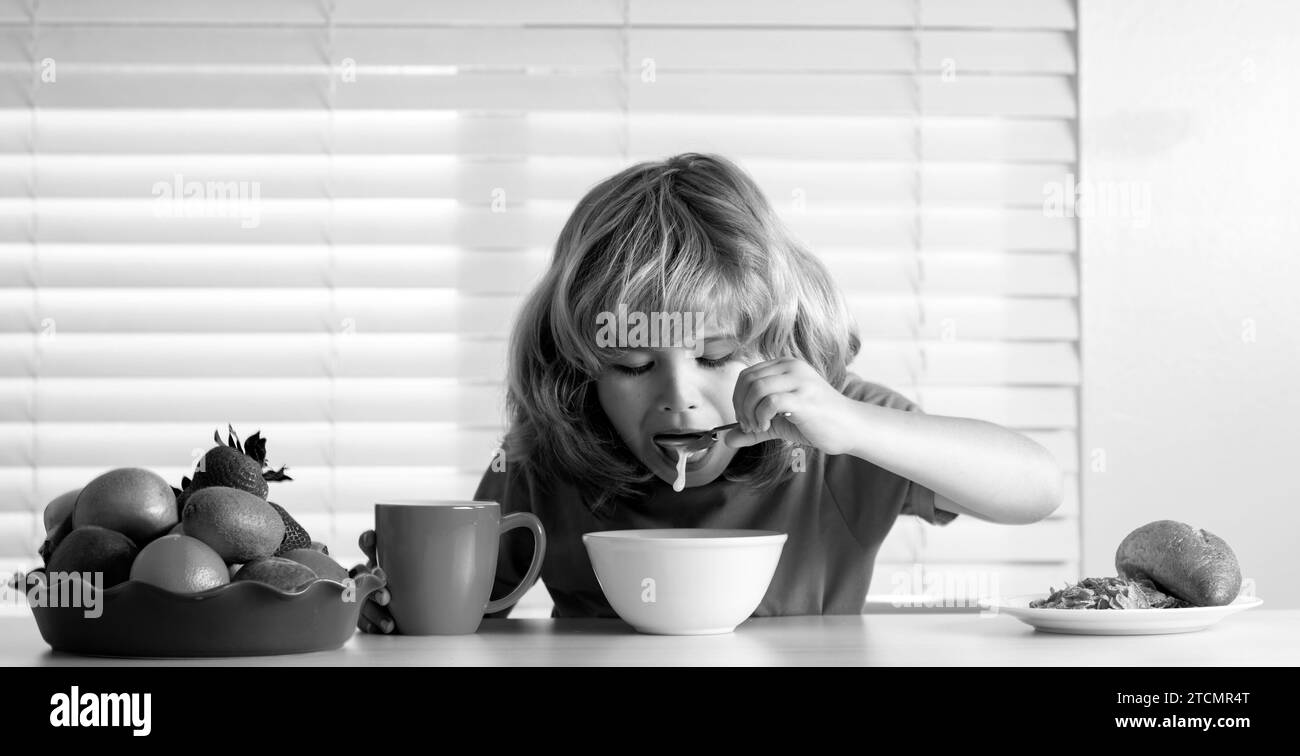Child eating meal. Healthy nutrition for children. Cute boy enjoy ...