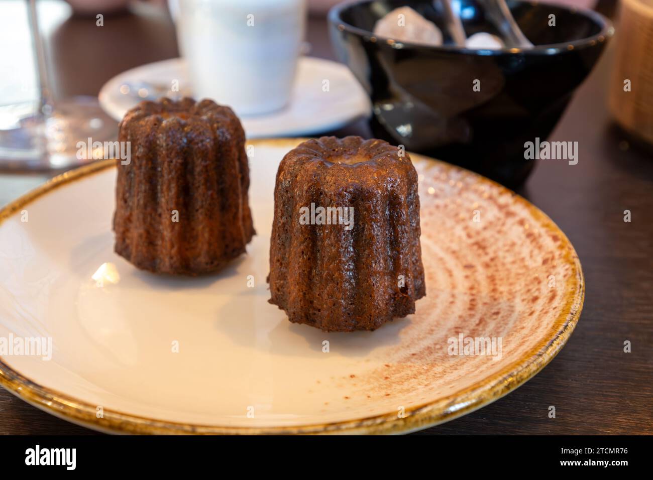 Canele, French pastry flavored with rum and vanilla, specialty of ...