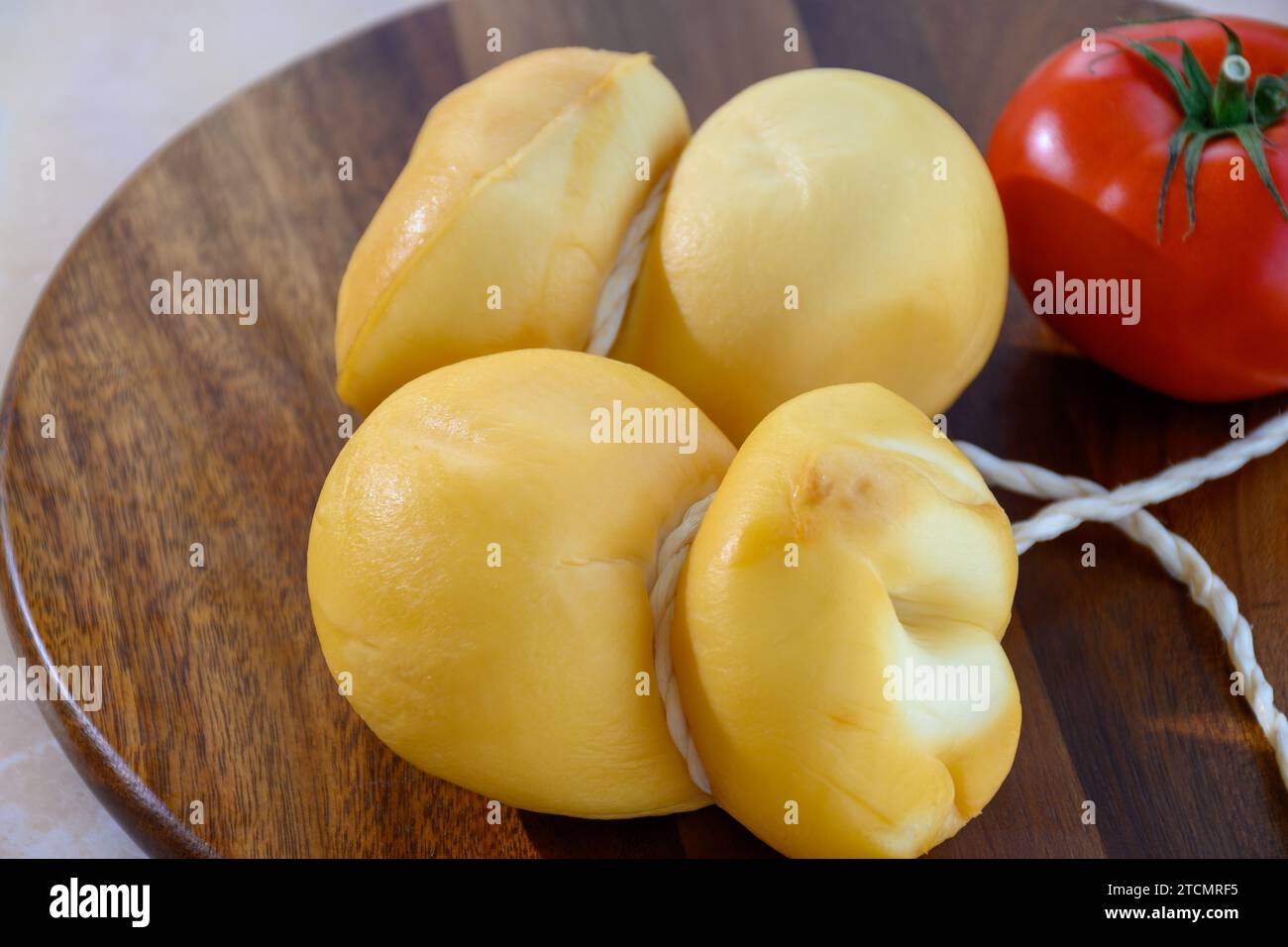 Italian semi hard handmade smoked scamorza cheese, from cow milk from ...