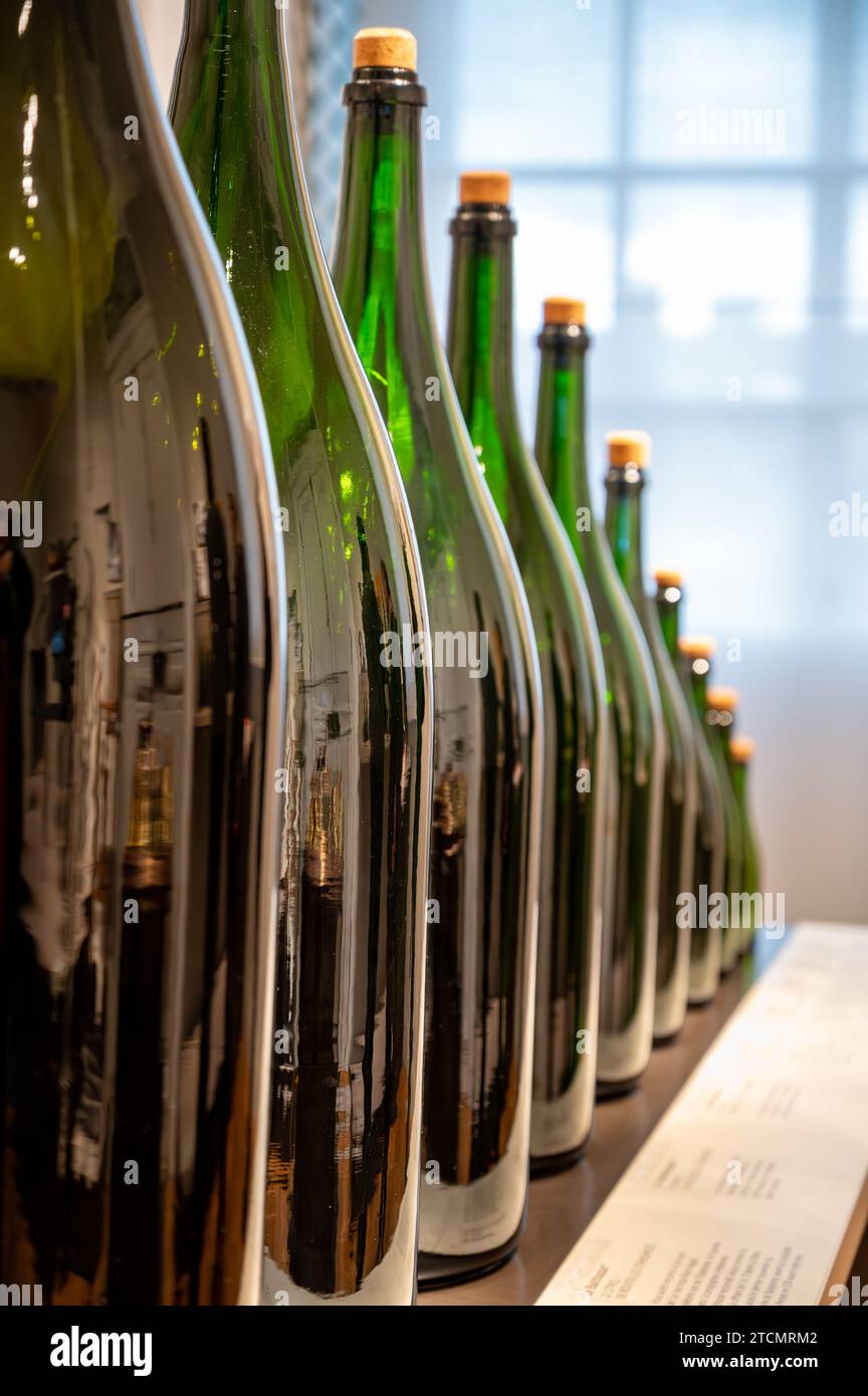 Different sizes of champagne bottles, traditional making champagne ...