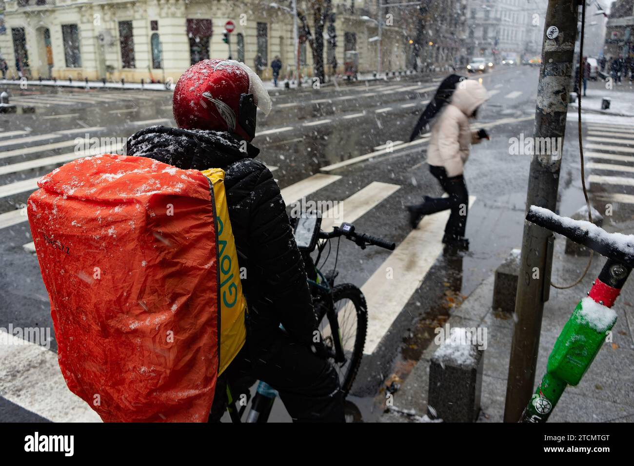 Bucharest, Romania - 7th Dec, 2023: A Glovo food delivery courier ...