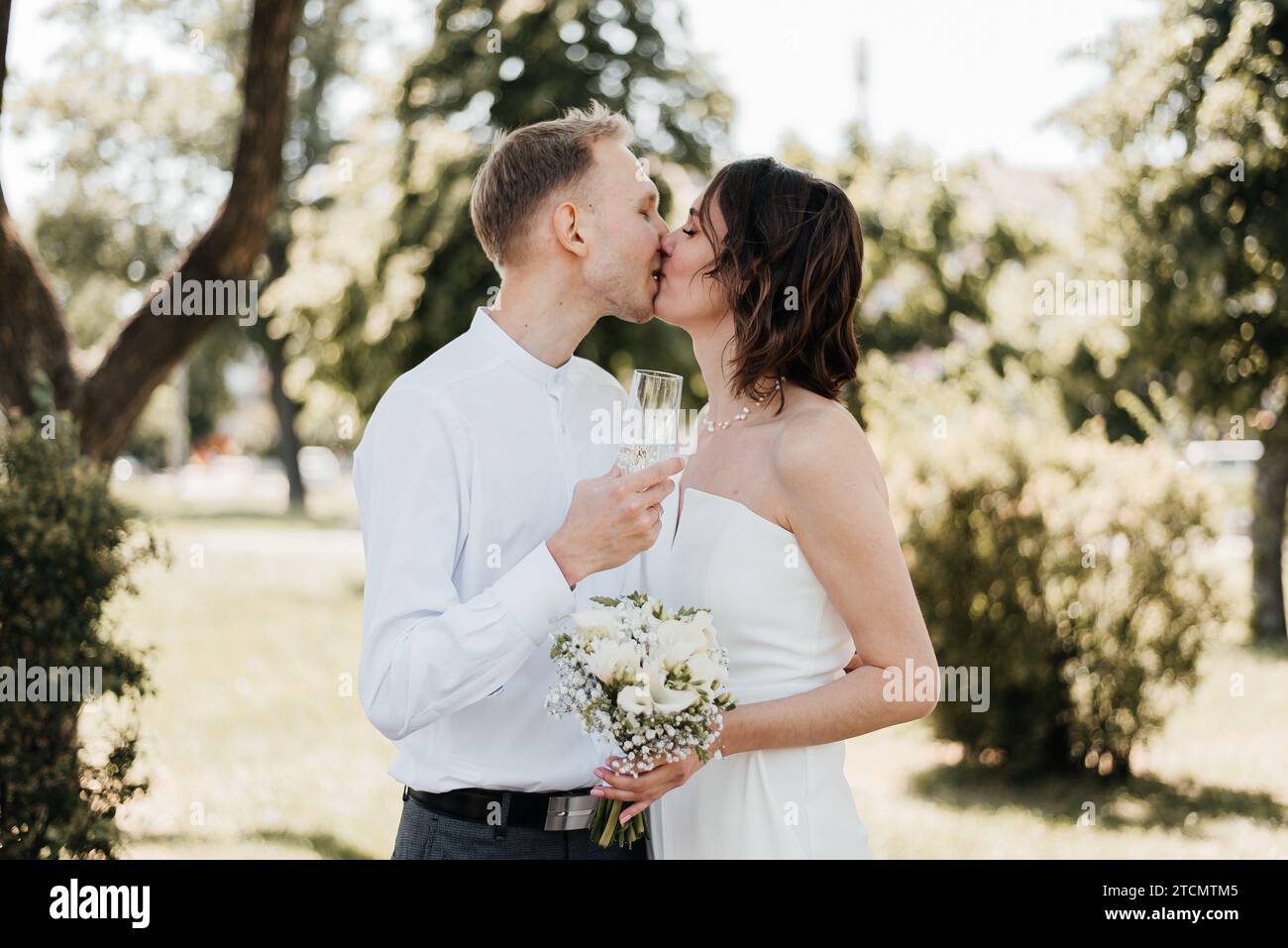 Happy bride and groom after wedding ceremony Stock Photo - Alamy