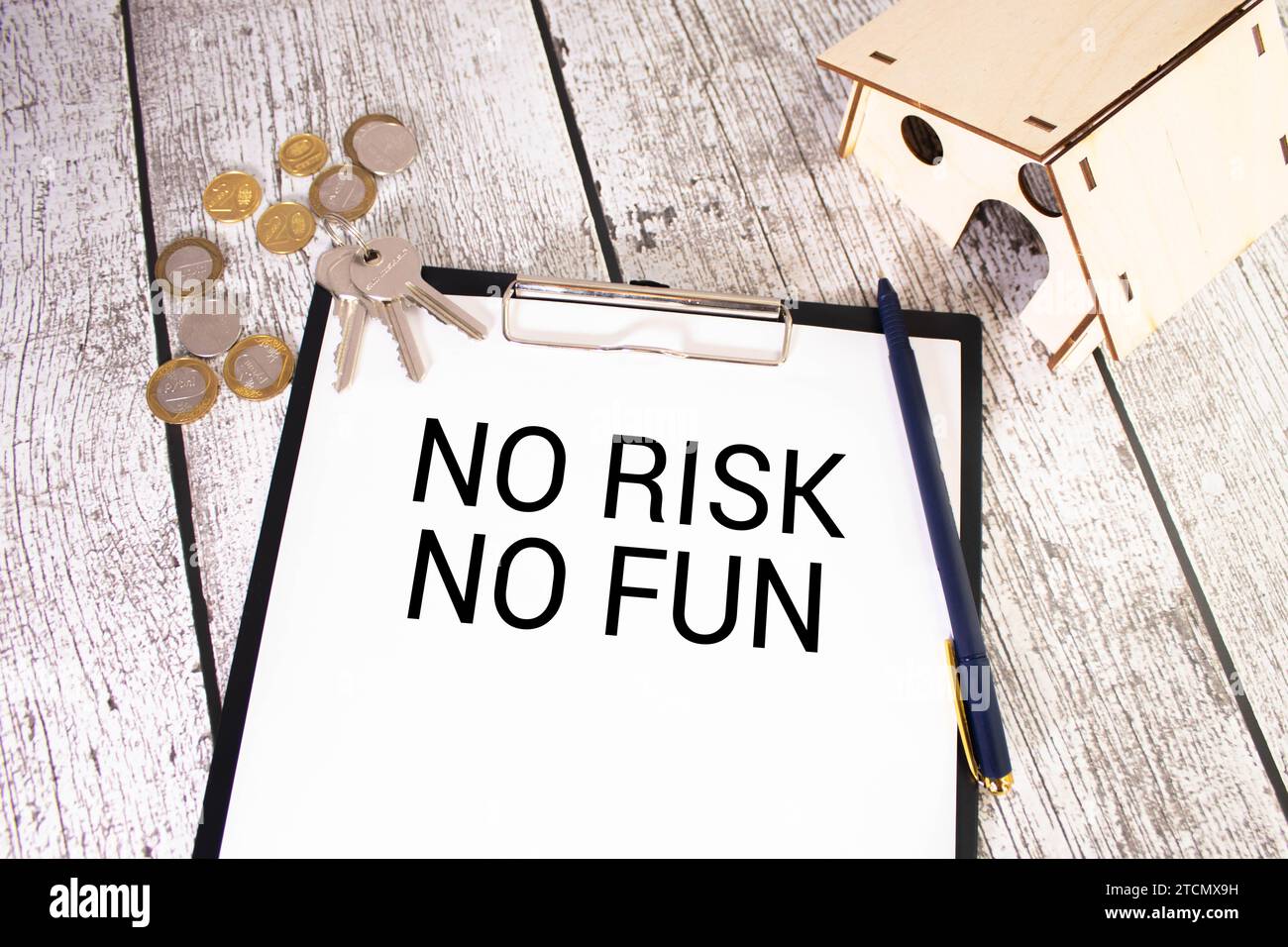 the inscription no risk no fun on the background of economic graphs ...