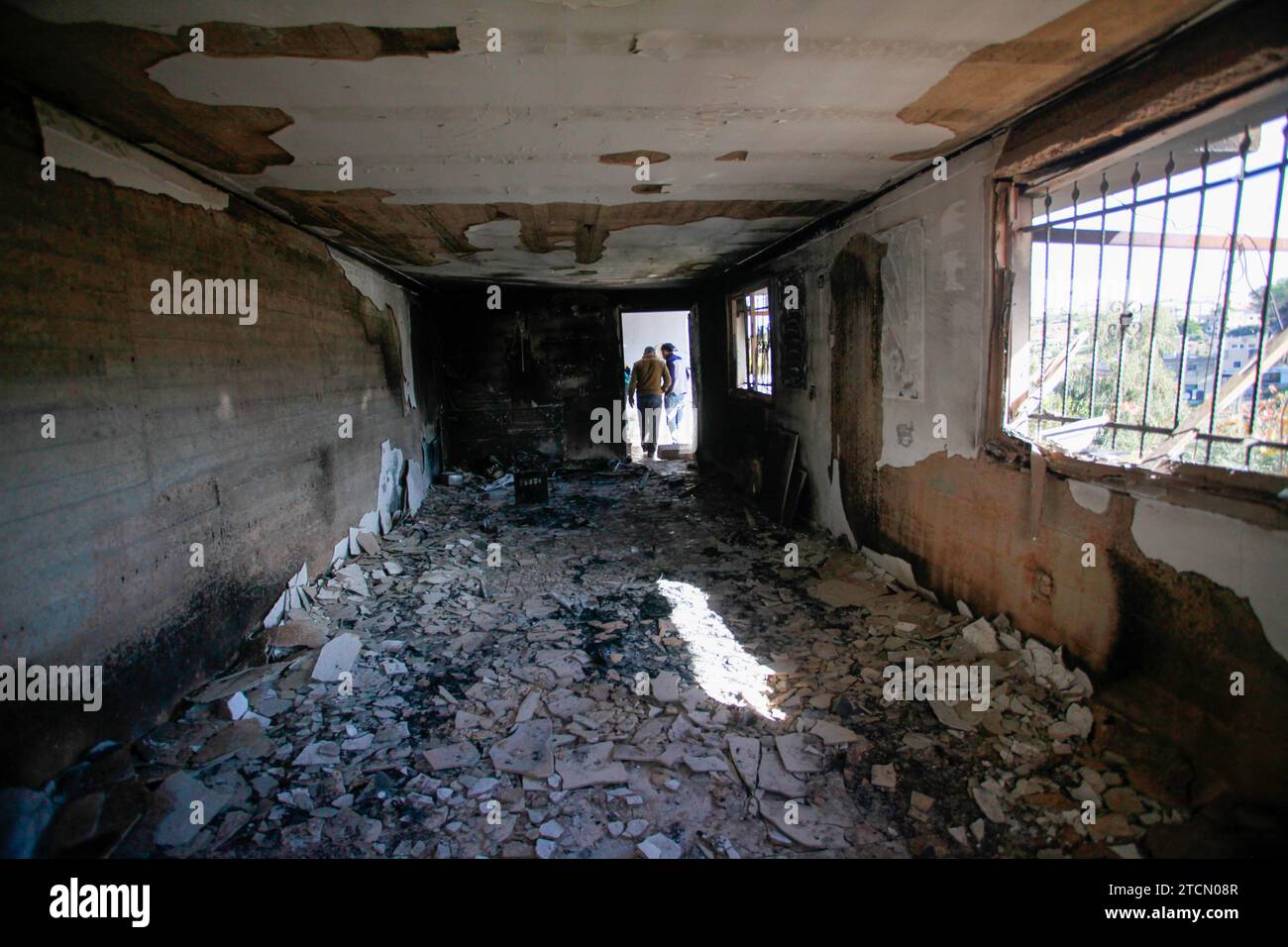 Jenin, Palestine. 13th Dec, 2023. Palestinian inspects the damage ...