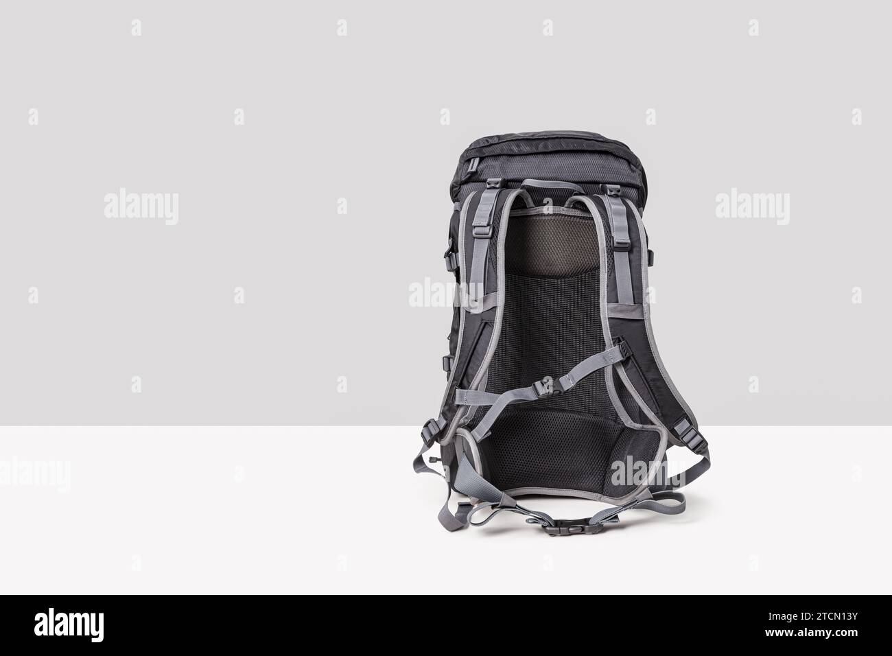 Black travel backpack isolated on a white background, back view Stock ...