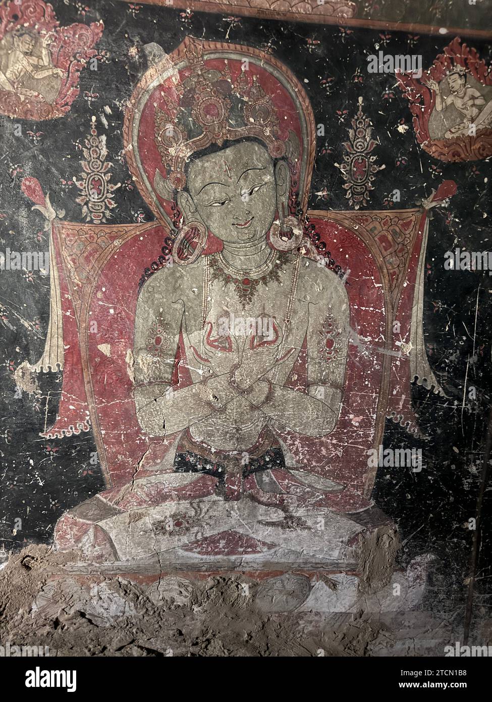 Buddhist deity painted above the 14th century 6 meter high chorten at ...
