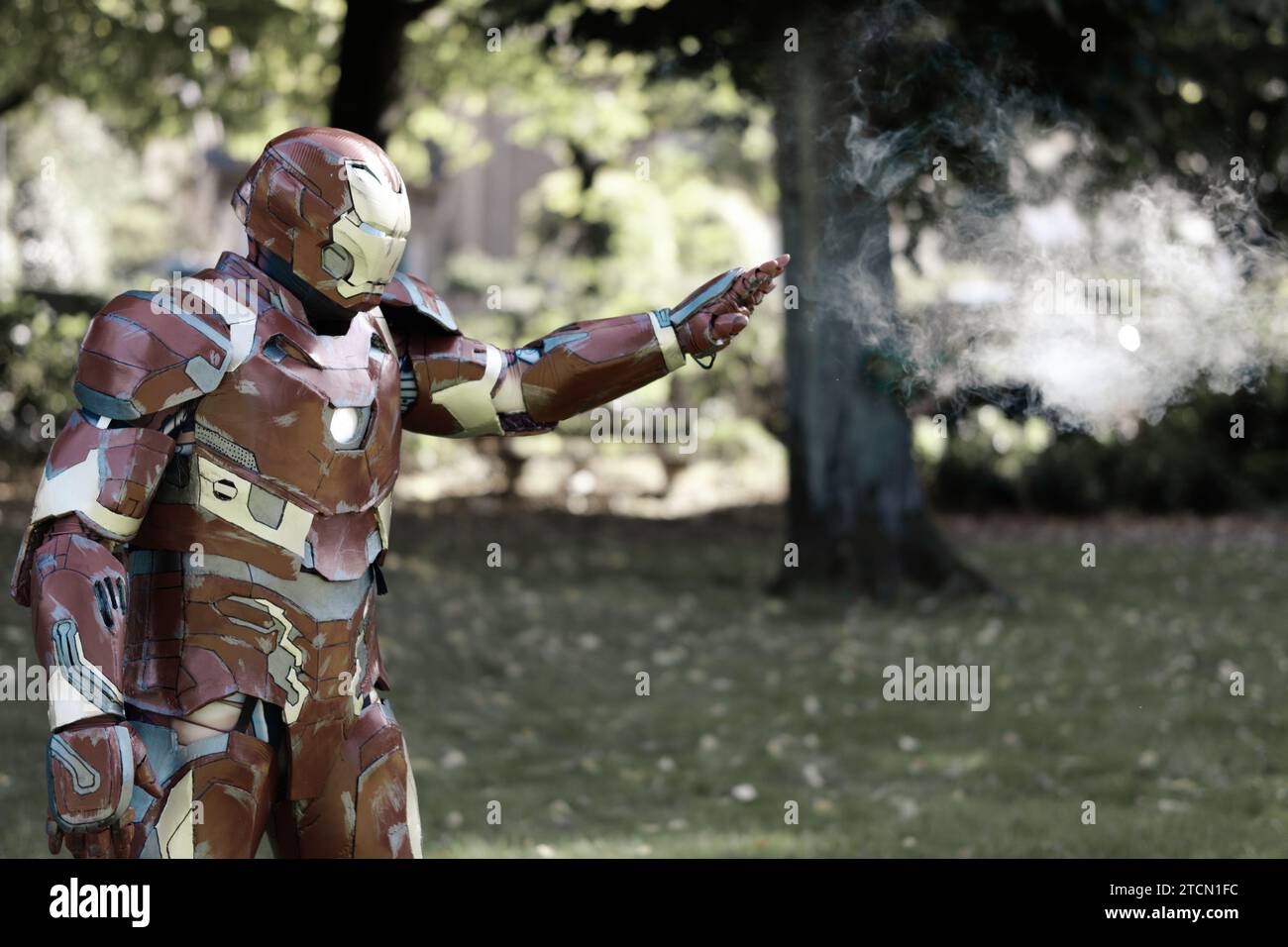 A male cosplayer dressed as Iron Man from the Marvel comics movie ...