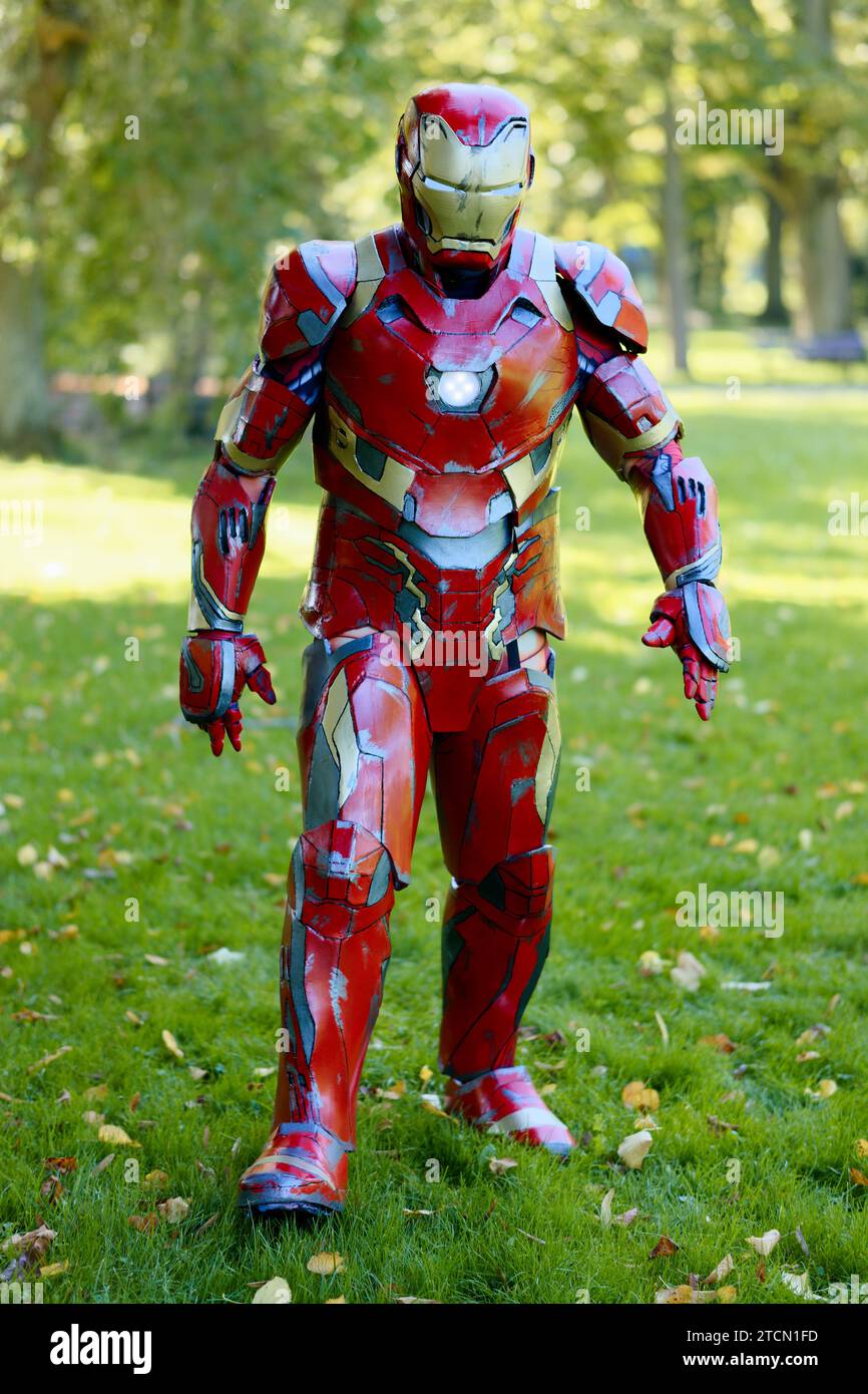 A male cosplayer dressed as Iron Man from the Marvel comics movie ...