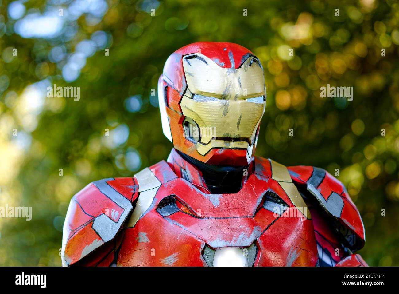 A male cosplayer dressed as Iron Man from the Marvel comics movie ...