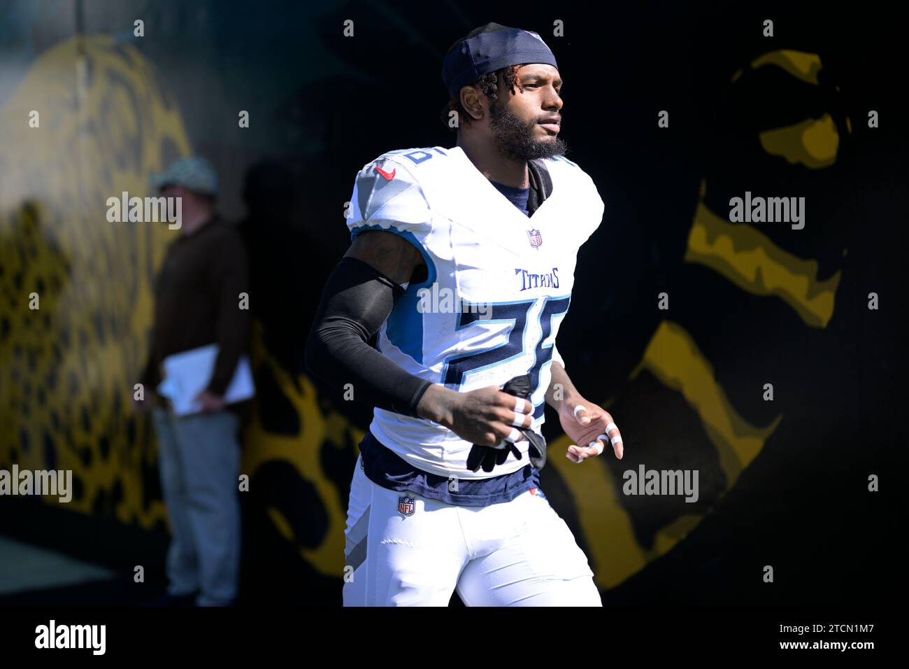 Tennessee Titans cornerback Kristian Fulton (26) runs to the field ...