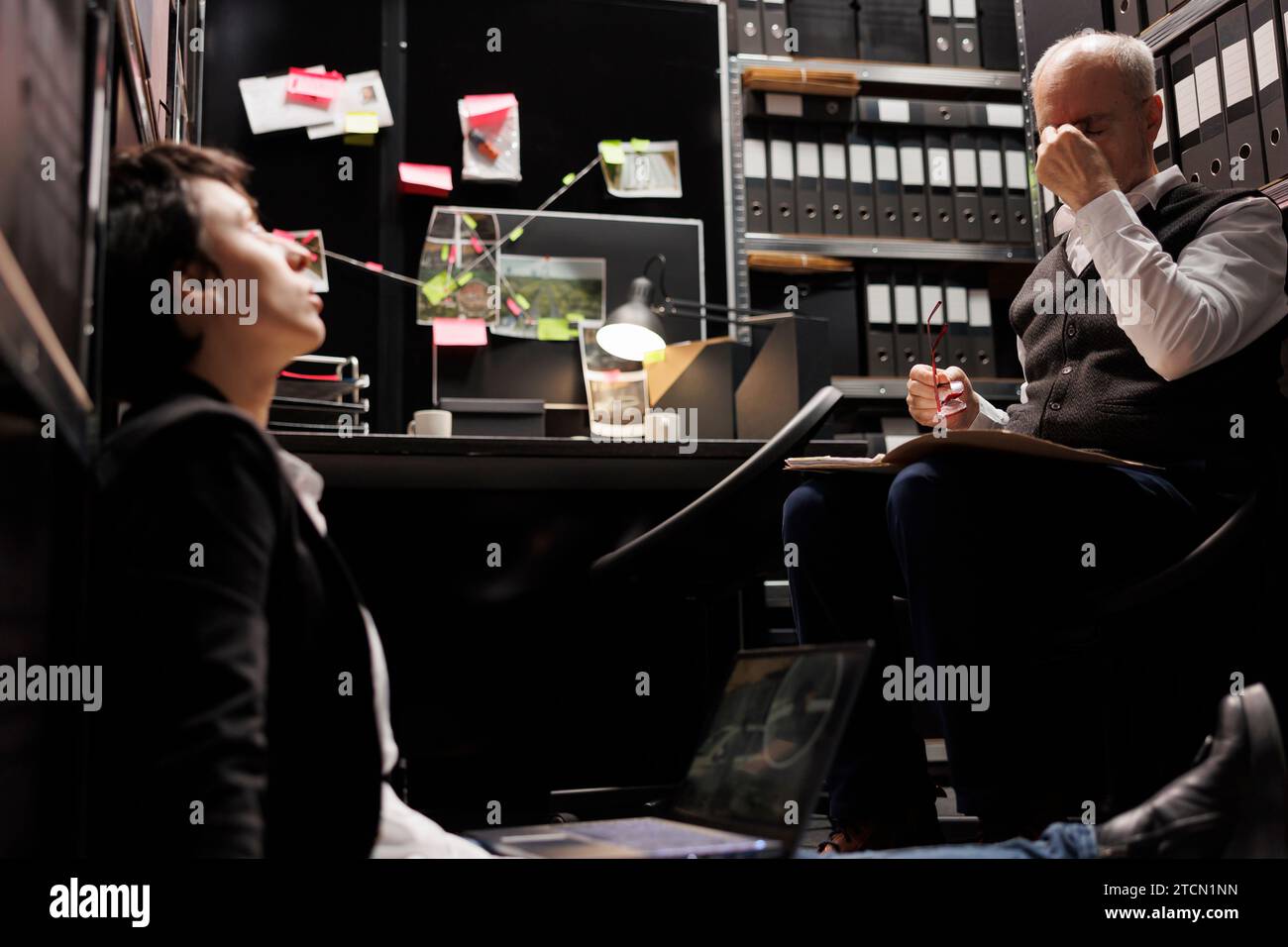 Overworked Investigators Working Overtime At Criminal Case Checking Victim Report In Arhive