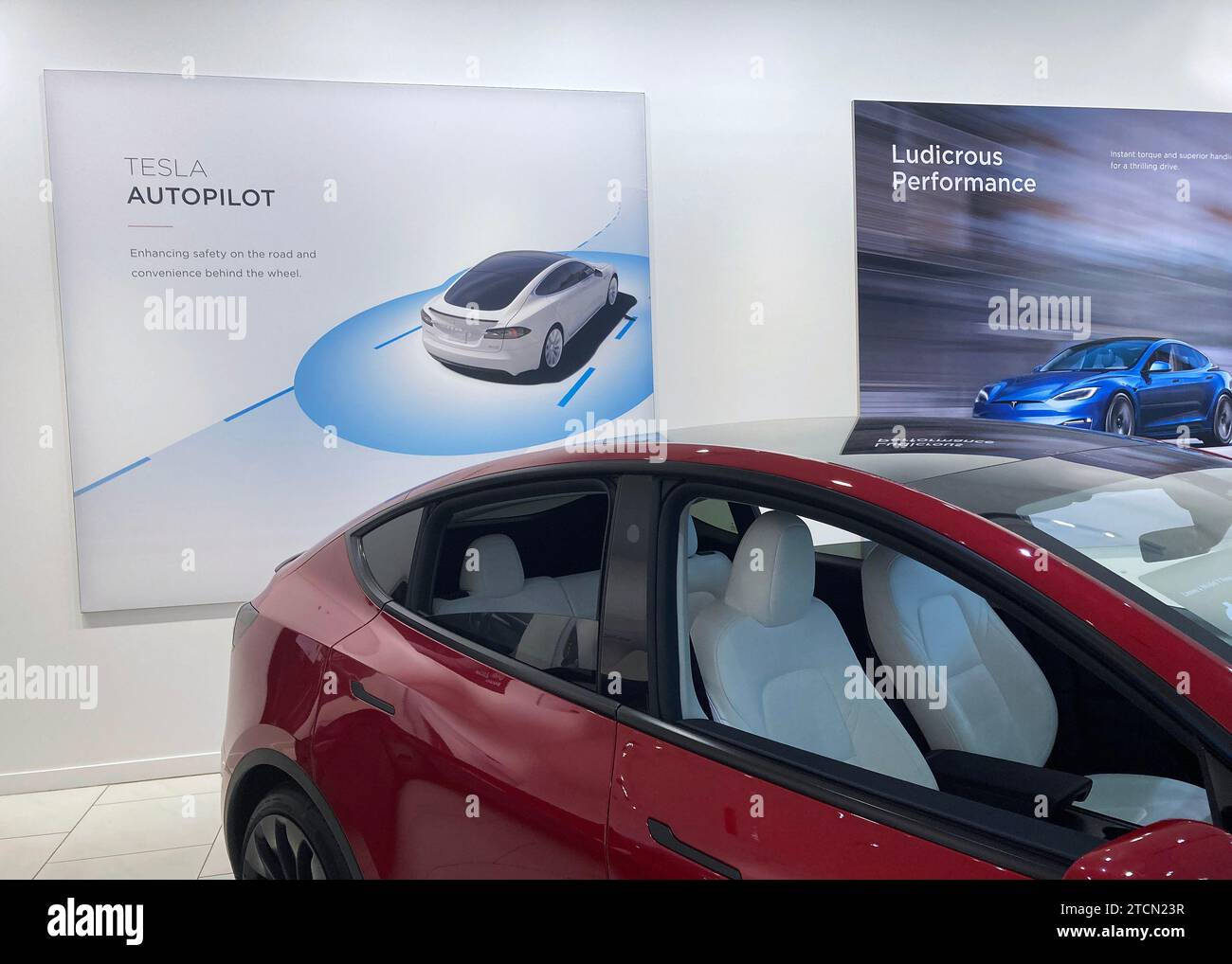 Orlando, United States. 13th Dec, 2023. A Tesla showroom is seen in ...