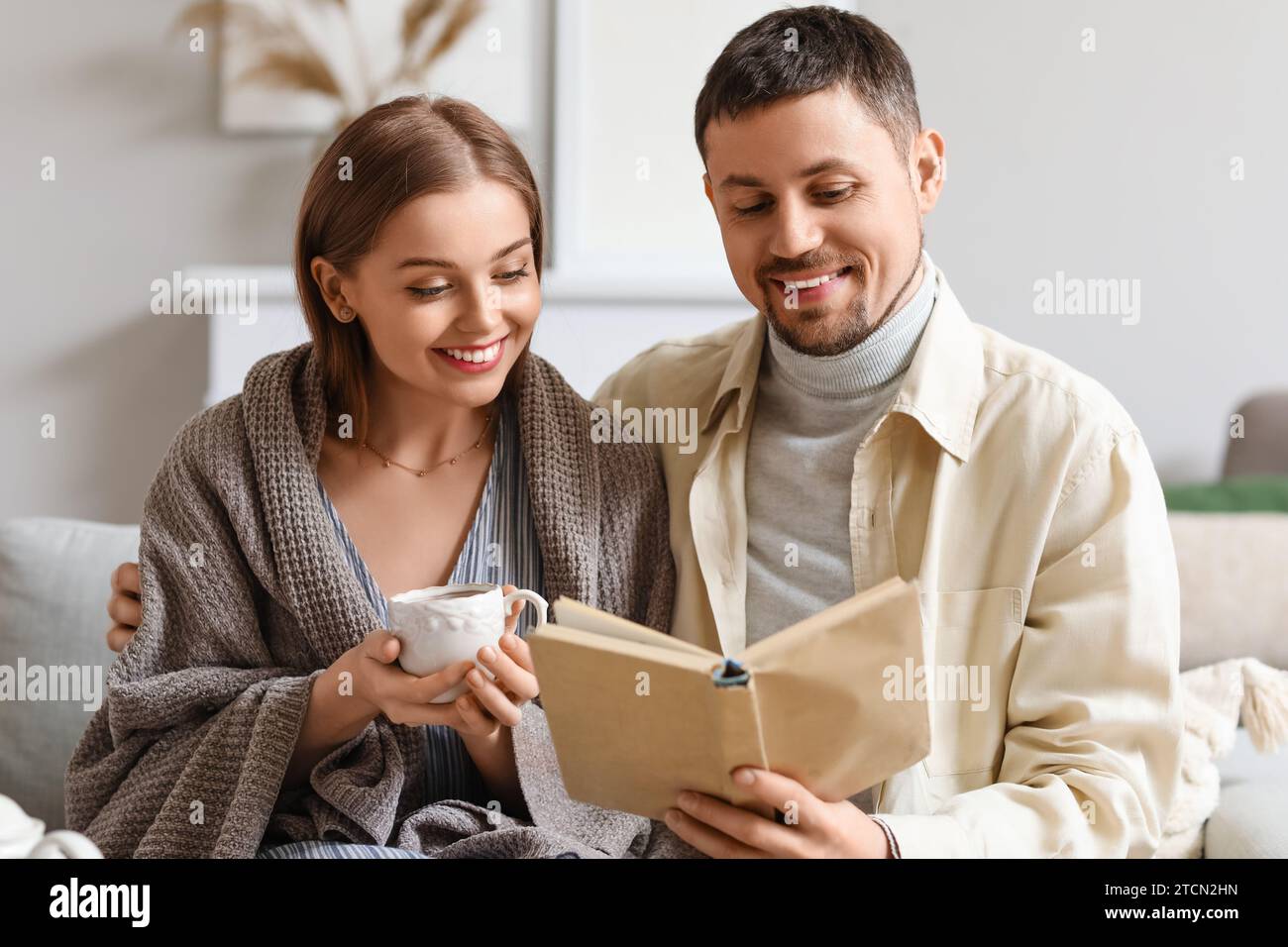Young lovely man reading book hi-res stock photography and images - Alamy