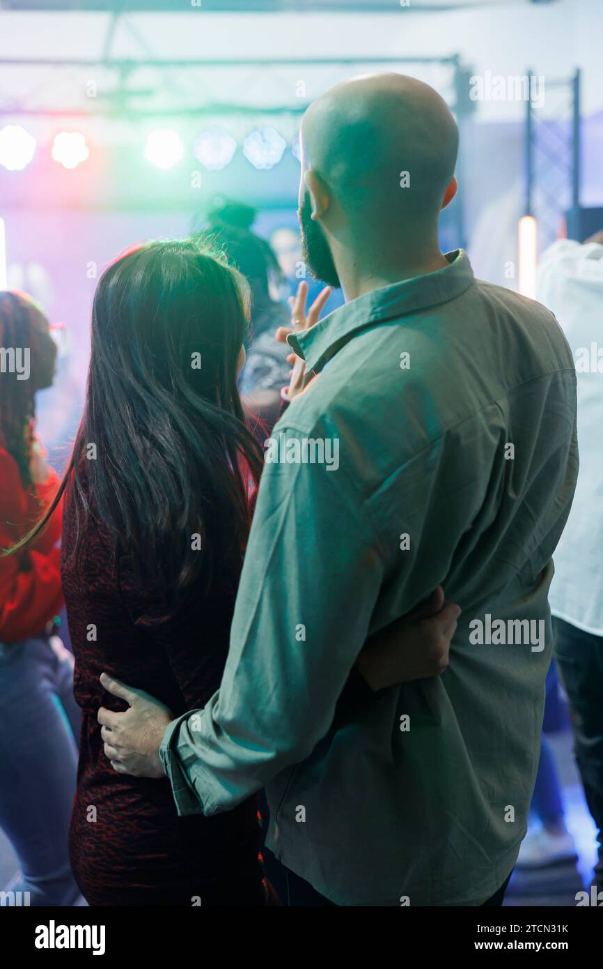 Diverse couple hugging waist hi-res stock photography and images - Alamy