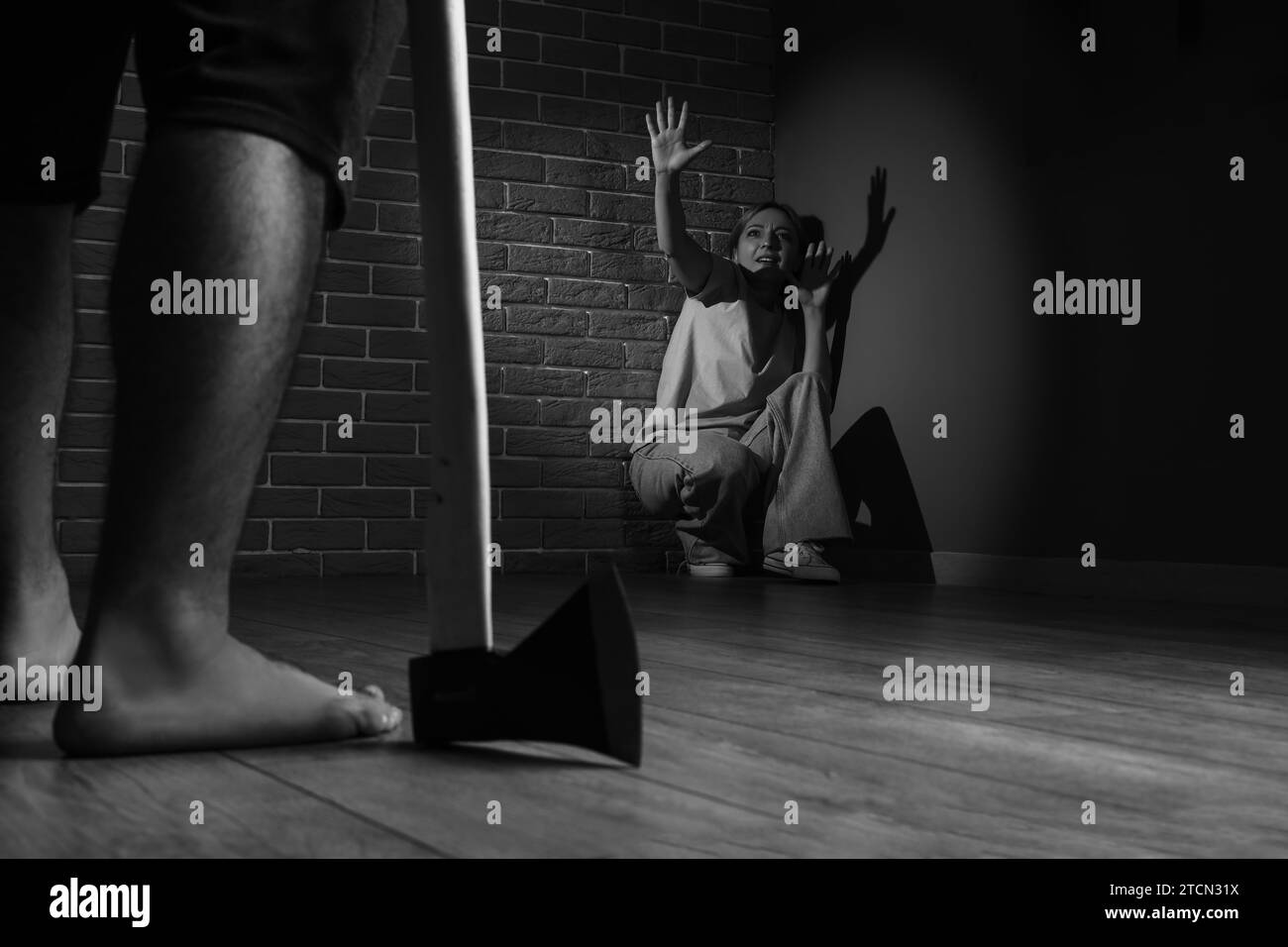 Man sitting in corner dark hi-res stock photography and images - Alamy