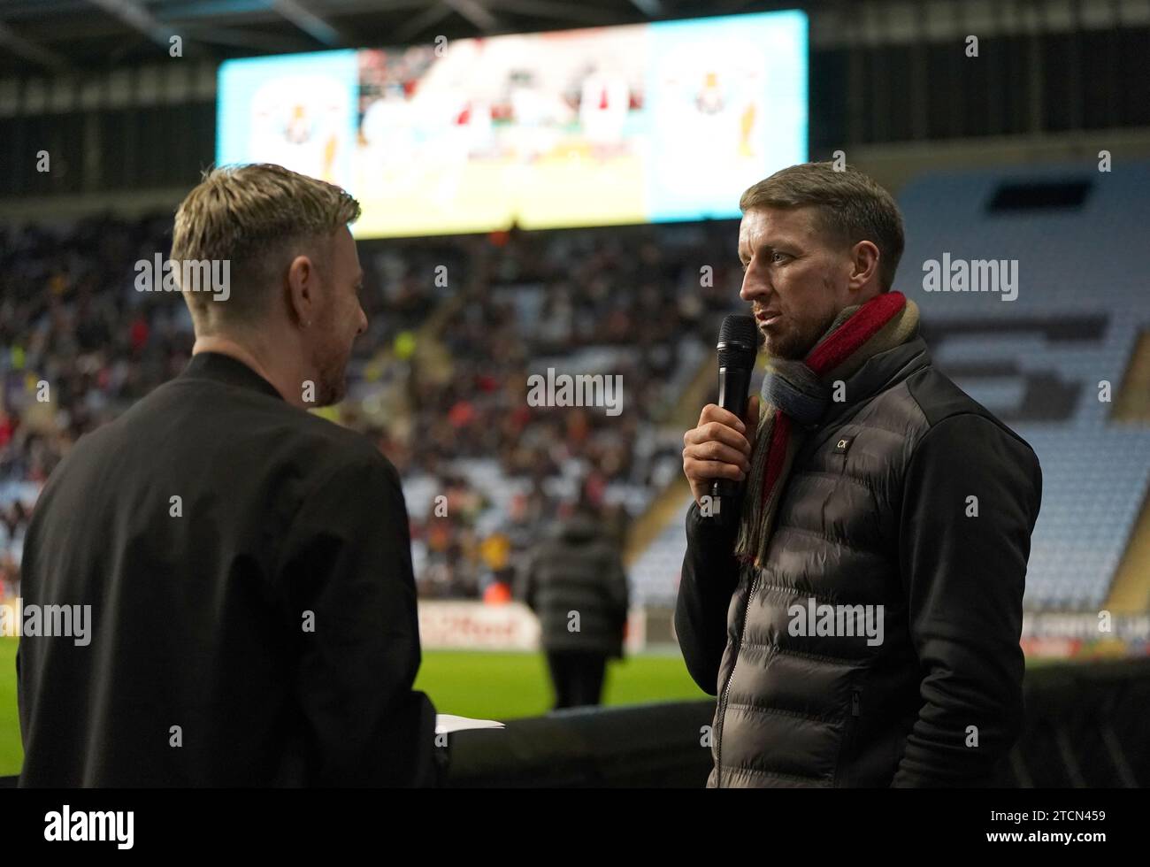 Former Coventry City player Carl Baker is interviewed at half-time ...